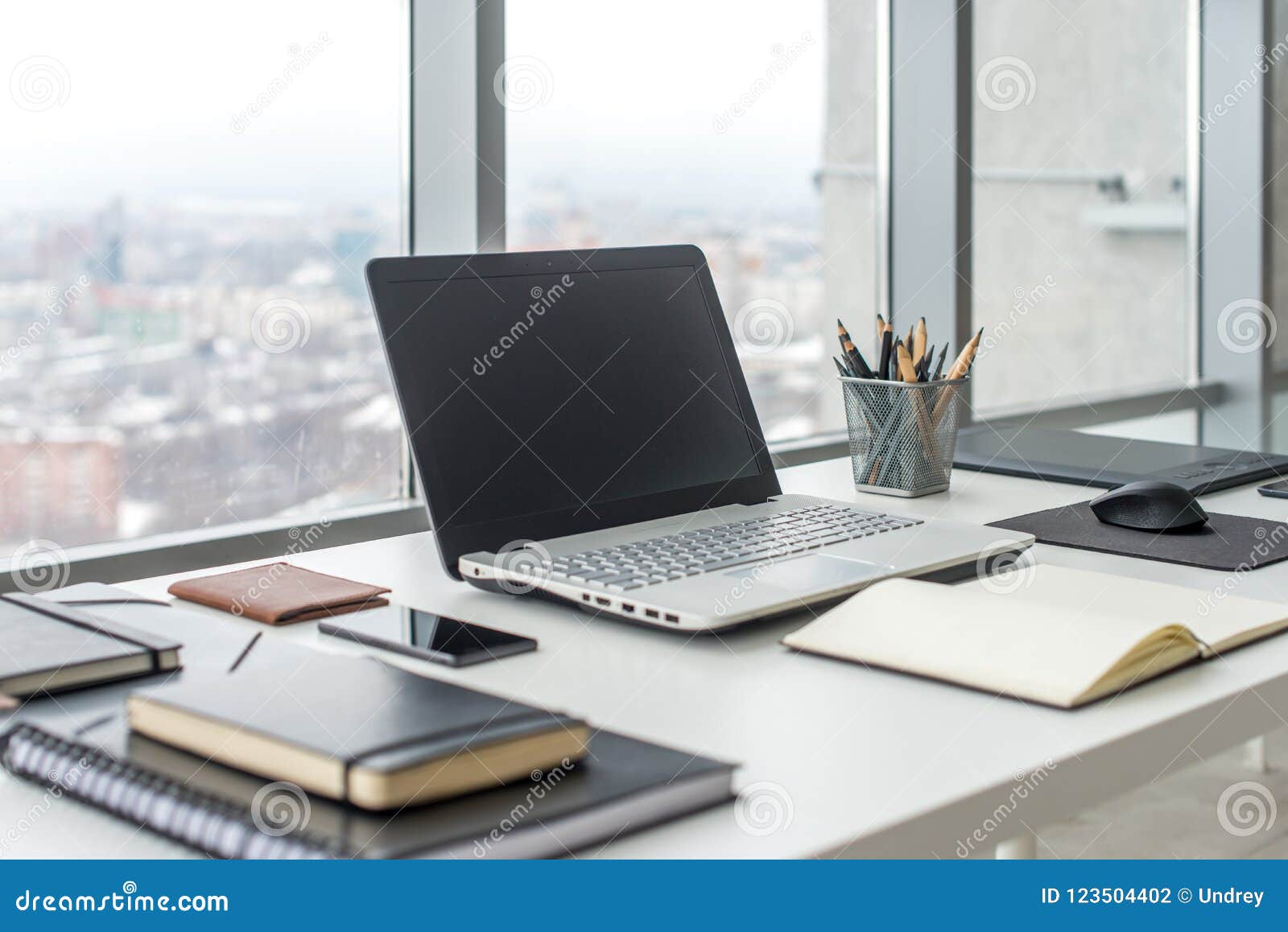 Workplace with Notebook Laptop Comfortable Work Table in Office Windows ...