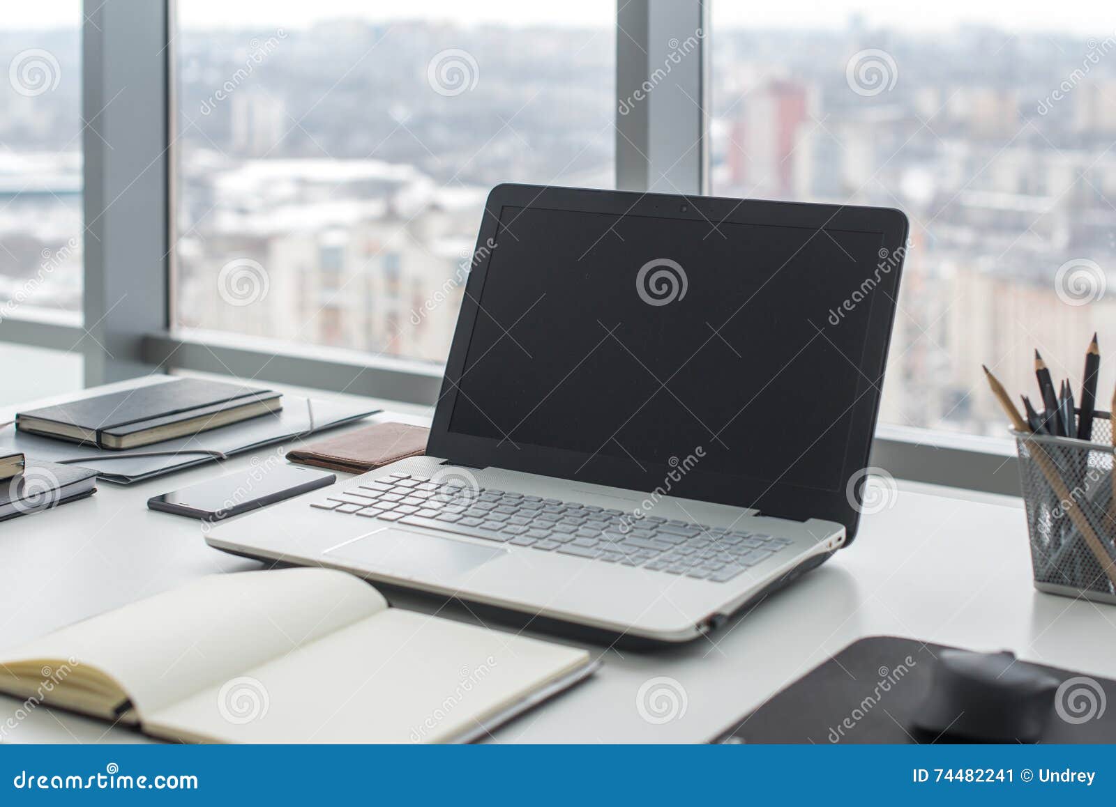 Workplace with Notebook Laptop Comfortable Work Table in Office Windows ...