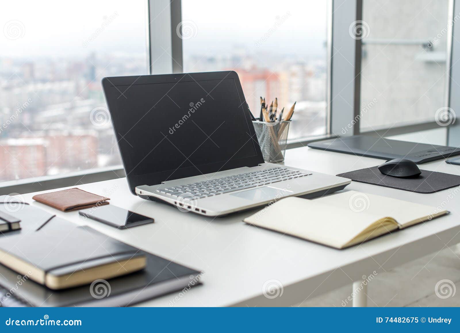 Workplace with Notebook Laptop Comfortable Work Table in Office Windows ...