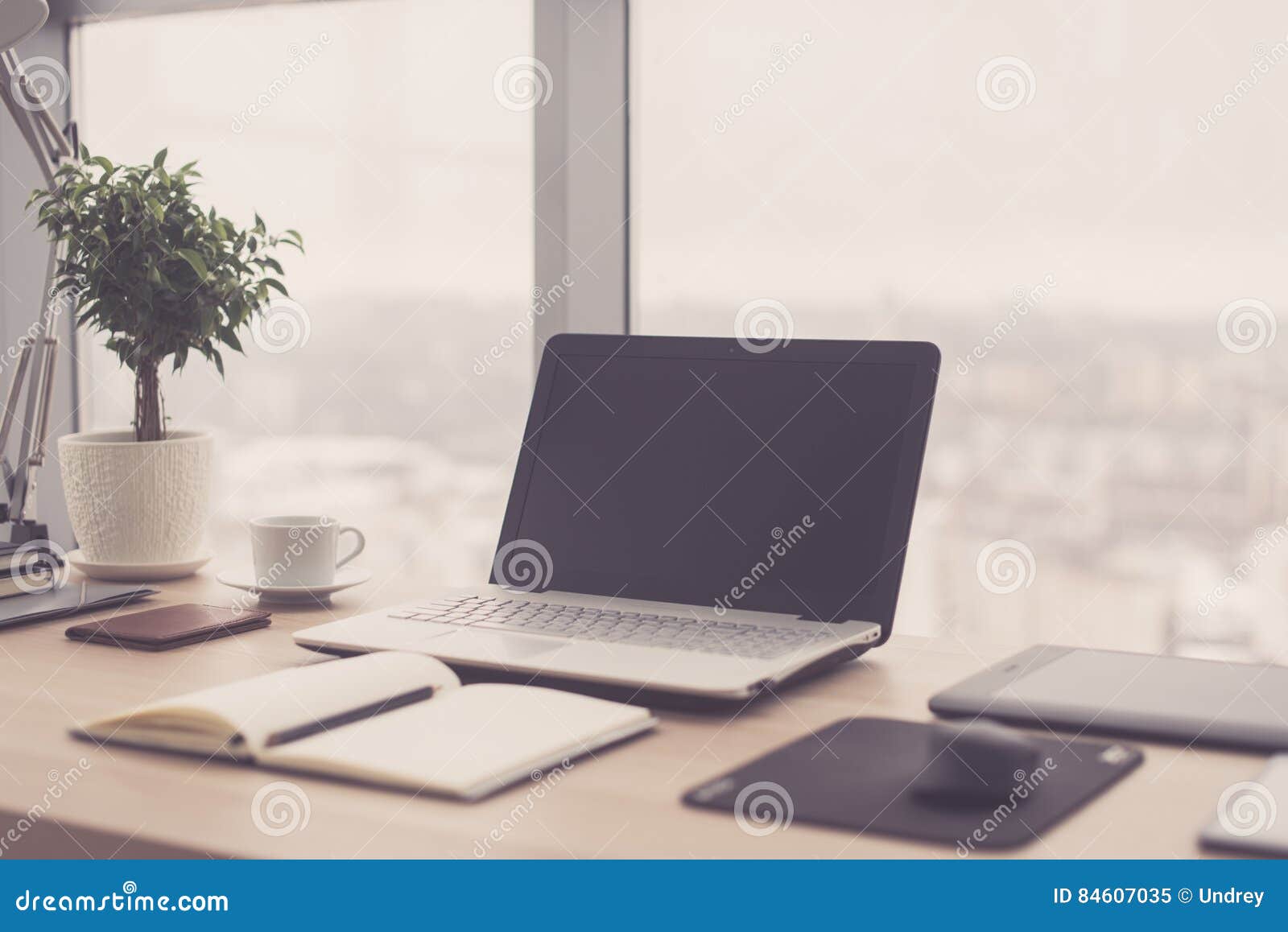 Workplace with Notebook Laptop Comfortable Work Table in Office Windows ...