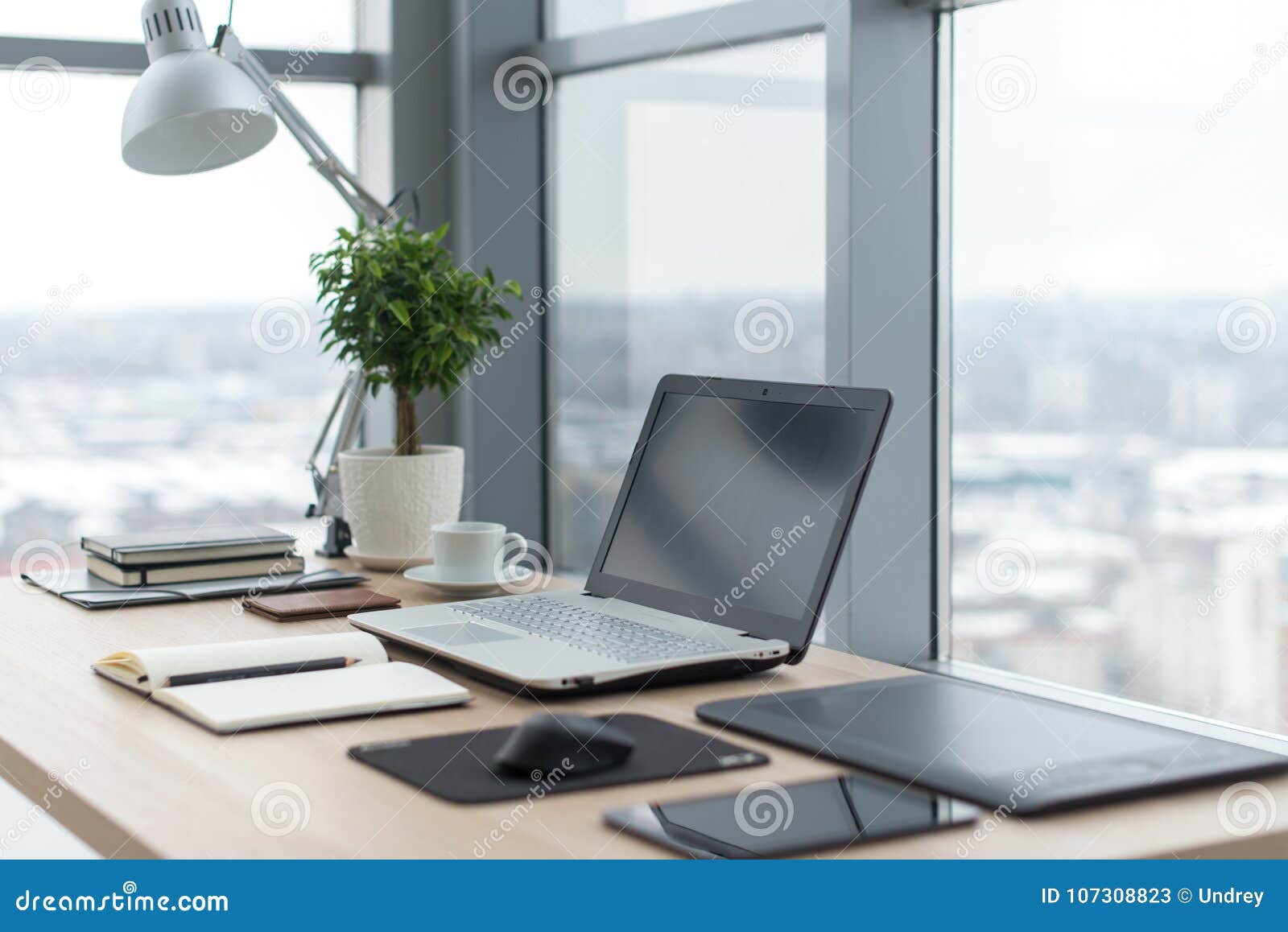 Workplace with Notebook Laptop Comfortable Work Table in Office Windows ...