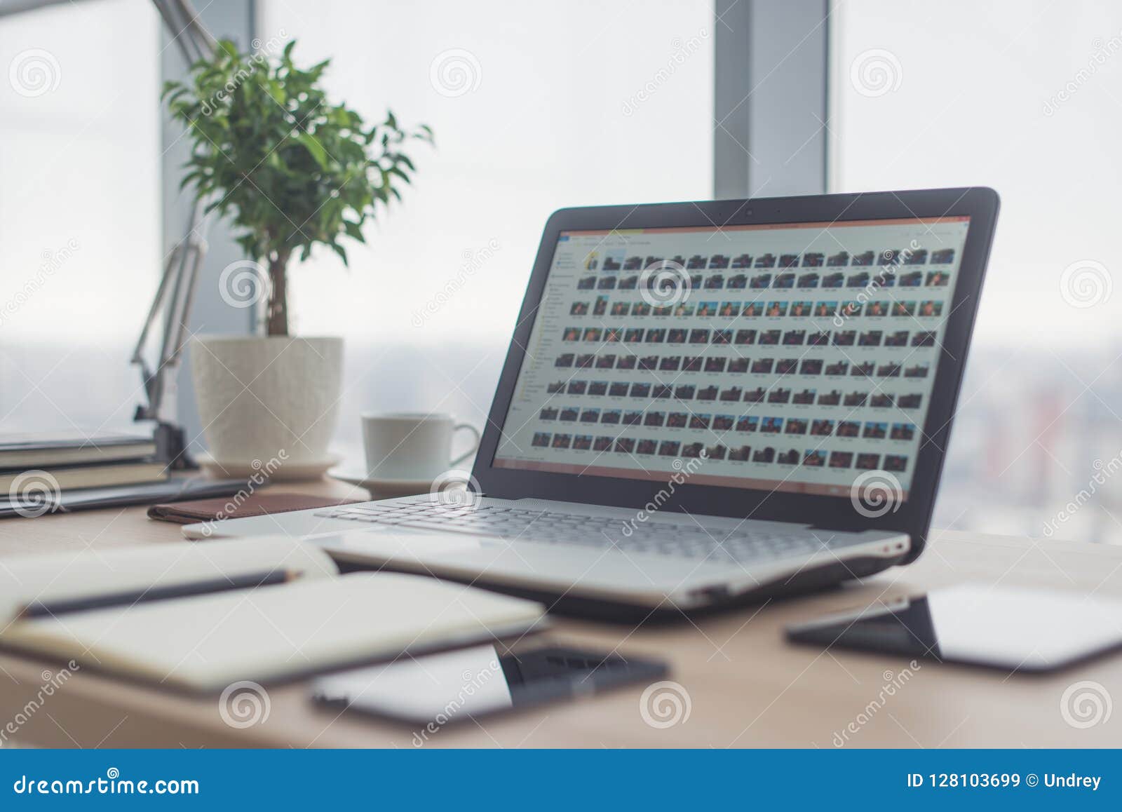 Workplace with Notebook Laptop Comfortable Work Table in Office Windows ...