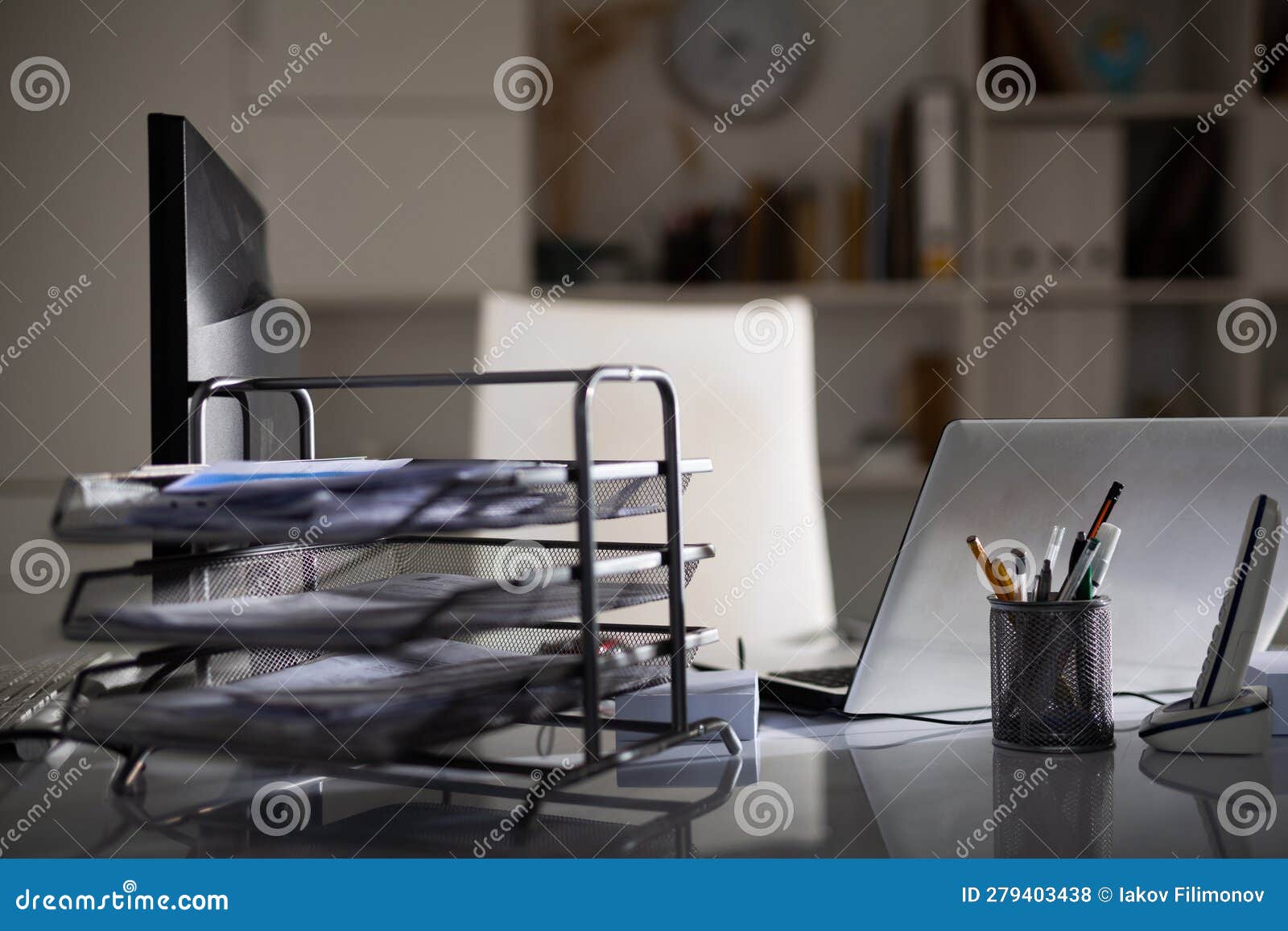 Workplace for Two with Laptop and Desktop Computer Monitor in Dark ...