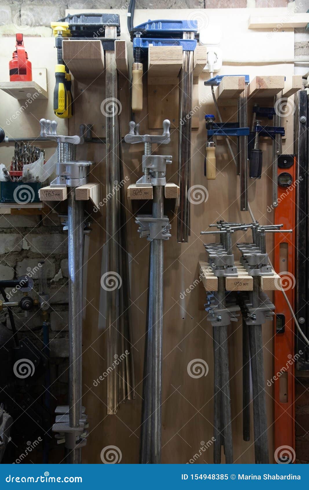 Workplace in the Workshop: Wall Storage of Clamps Stock Image - Image ...