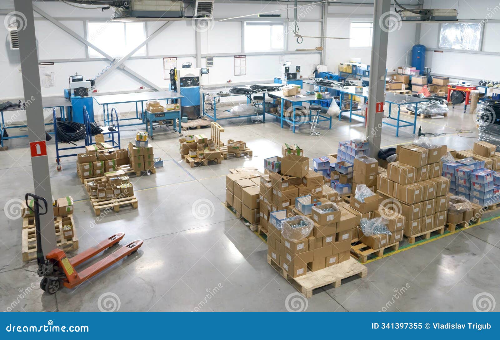Workplaces with Machines and Organized Warehouse with Many Boxes ...