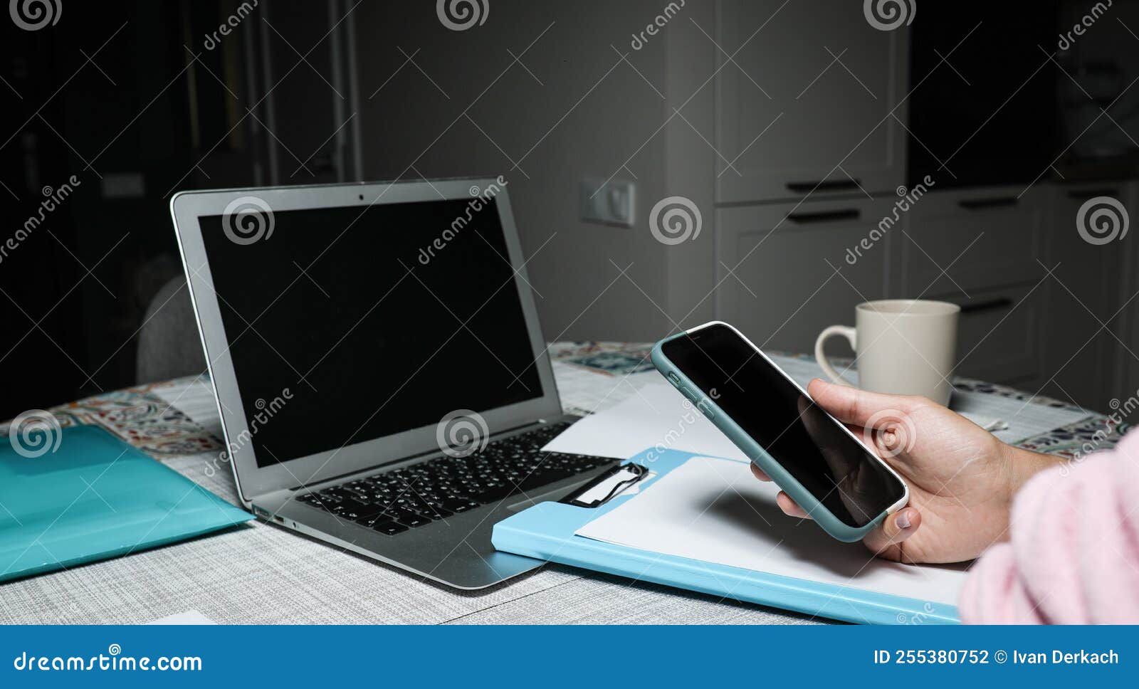 Works at the Computer on the Table Near the Kitchen Stock Photo - Image ...