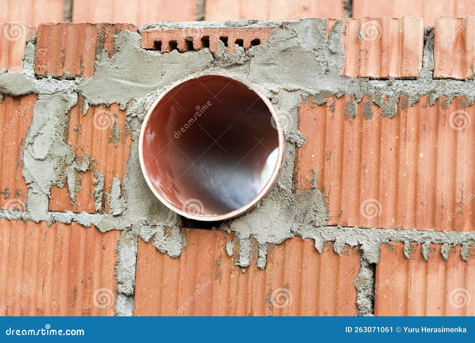 Works on the Laying of Ceramic Bricks. Red Brick Wall with Ventilation ...