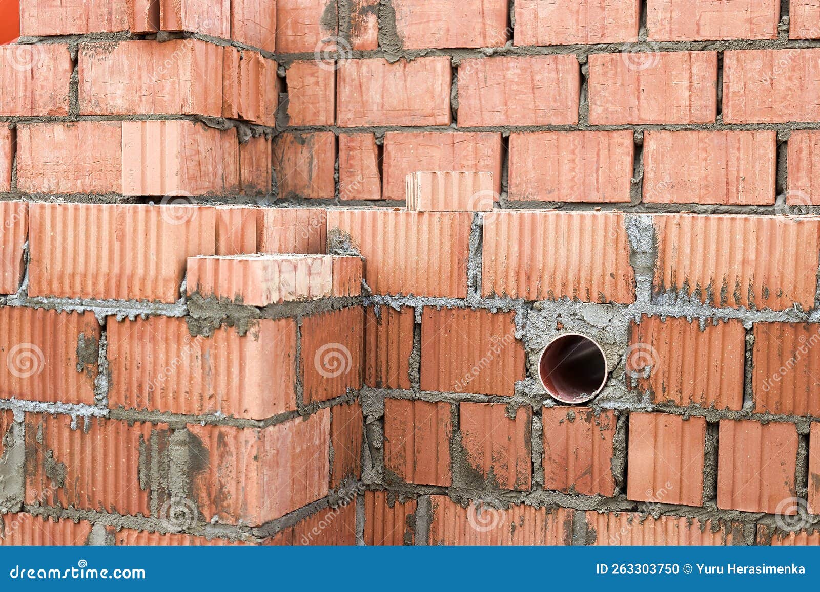 Works on the Laying of Ceramic Bricks. Red Brick Wall with Ventilation ...