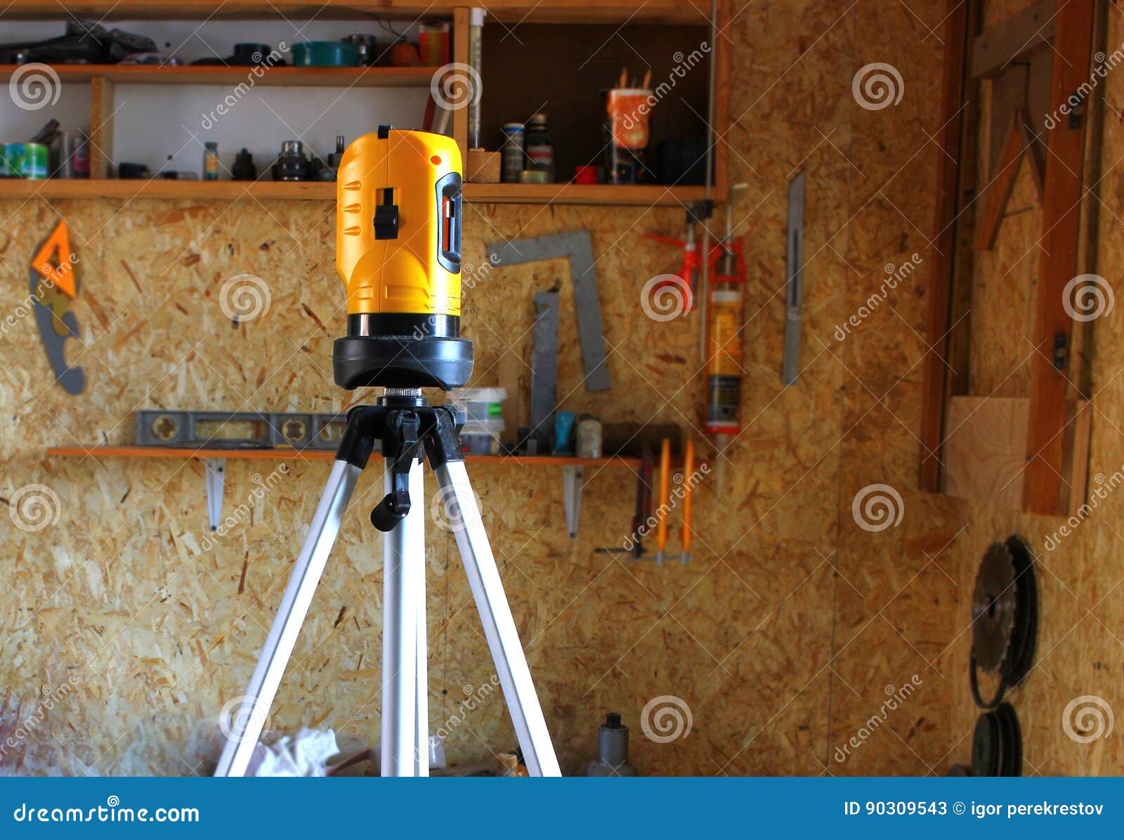 The Workshop is Built Initially, Using a Level for Testing the Surface ...