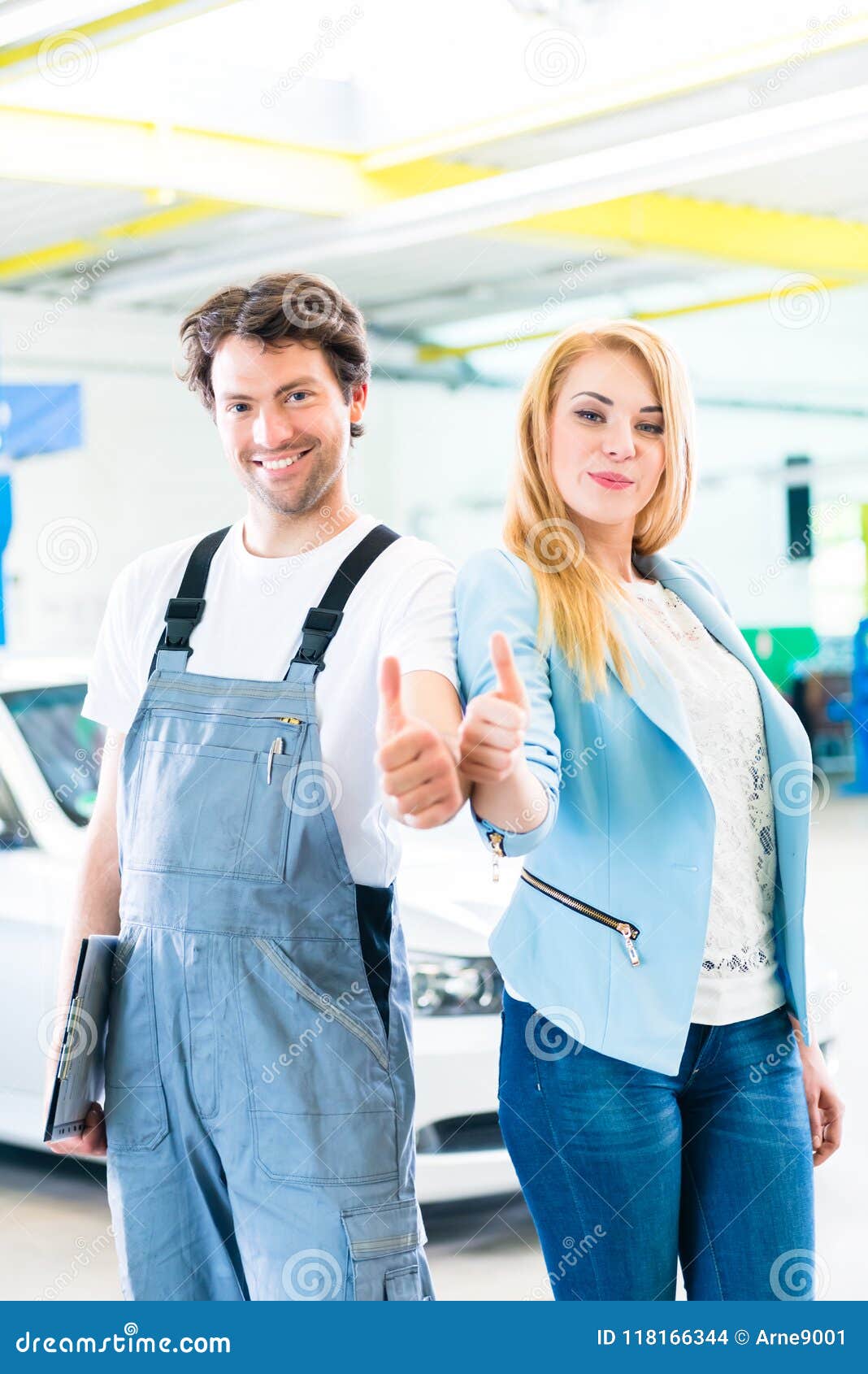 Workshop Mechanic Handing Over Car To Client Stock Photo - Image of ...