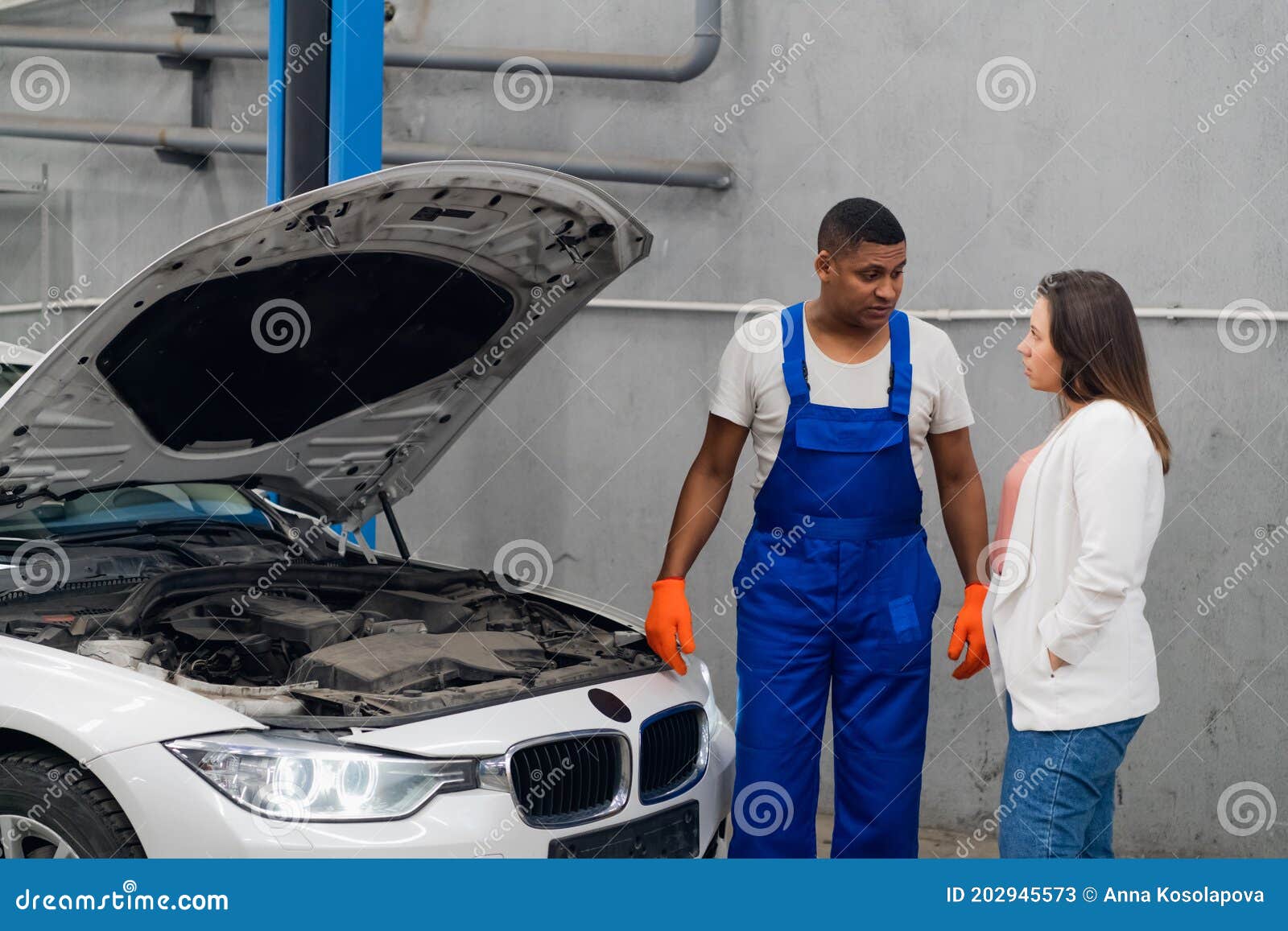 Workshop Worker and Customer Inspect Engine of Car Stock Image - Image ...