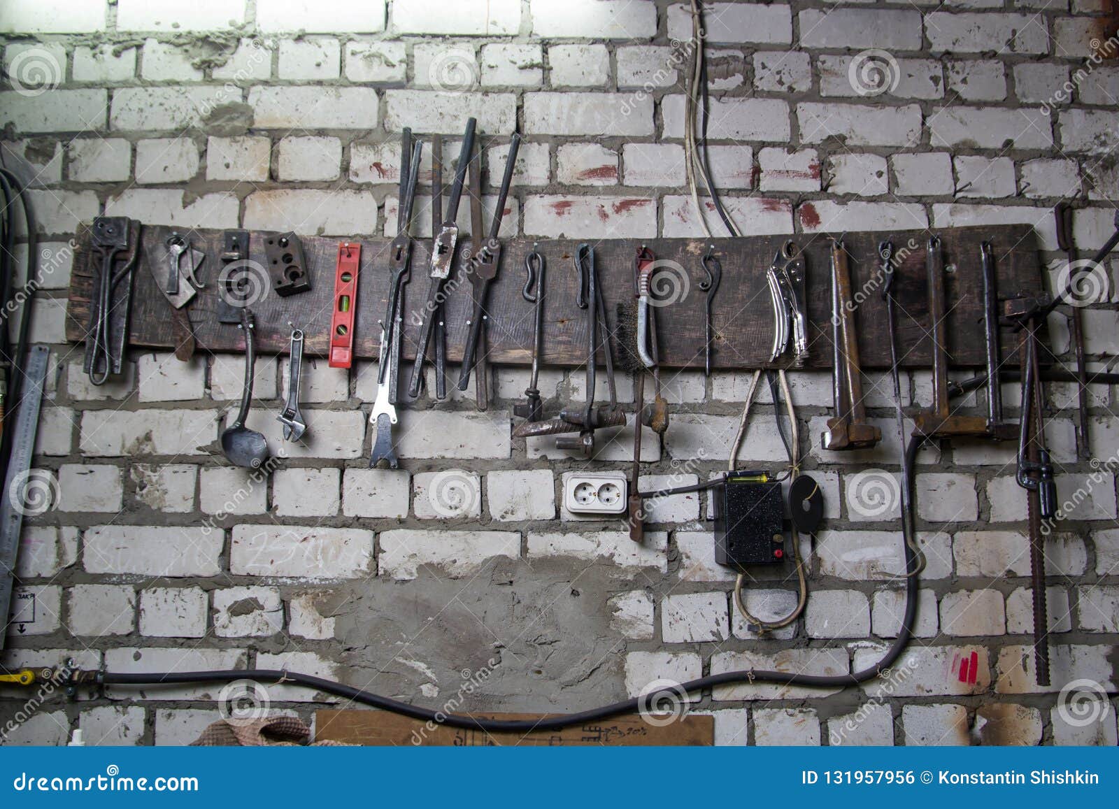 Workspace of Blacksmith. Some Tools on the Wall Stock Photo - Image of ...