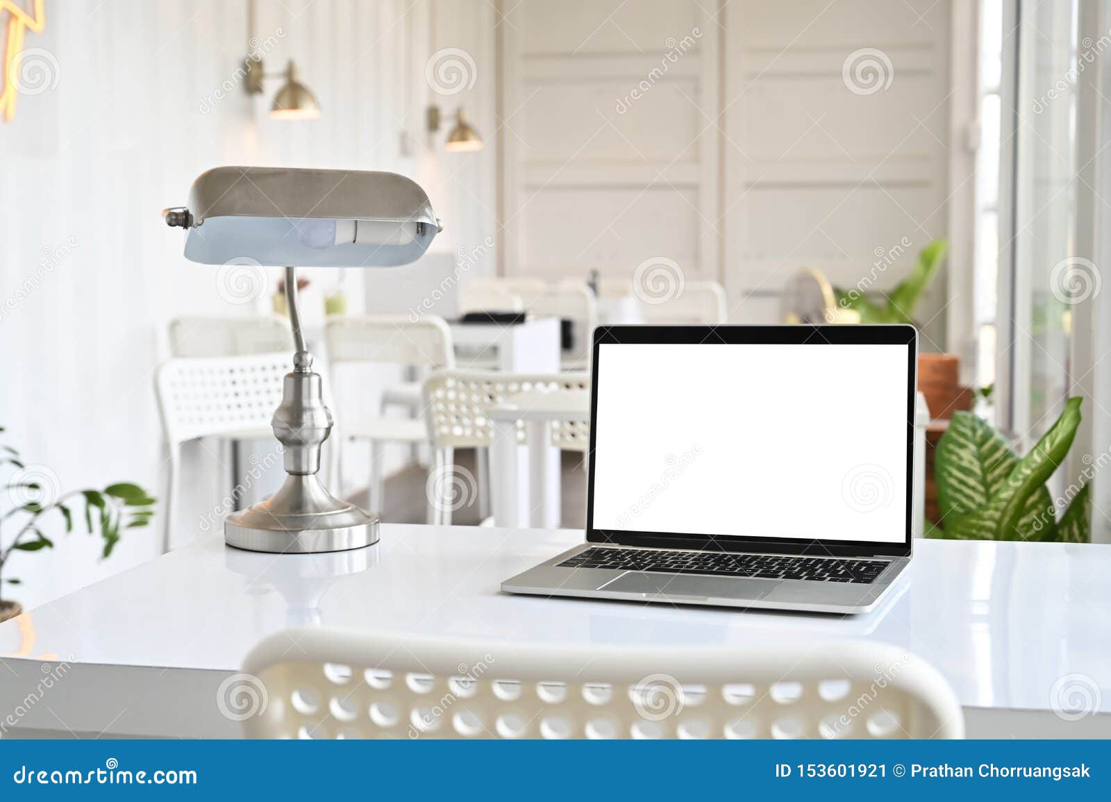 Workspace with Computer Laptop and Lamp on Office Table with Montage ...