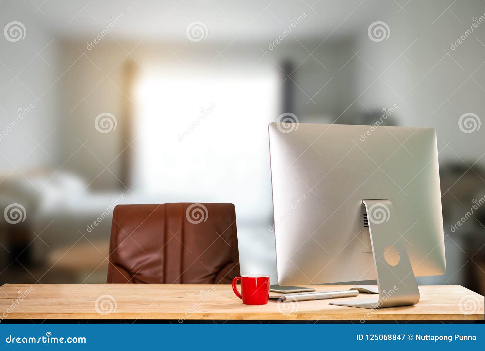 Workspace with Computer, Laptop, Office Supplies, and Coffee Cup Stock ...