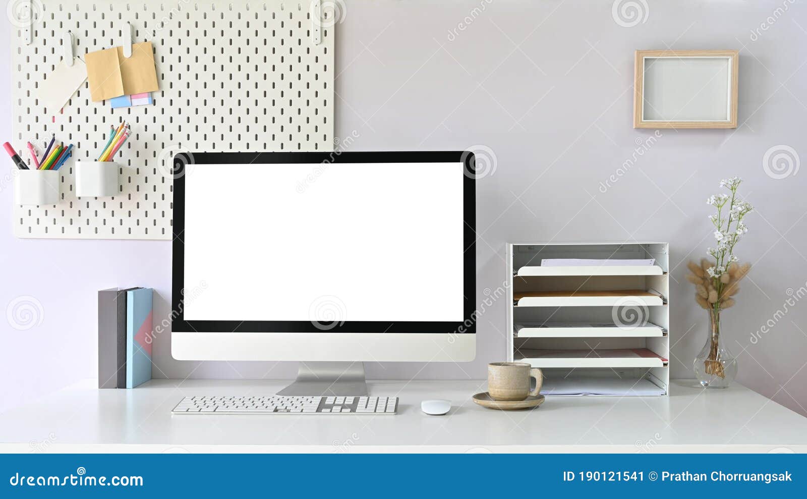 A Workspace Computer Monitor is Putting on a White Working Desk ...