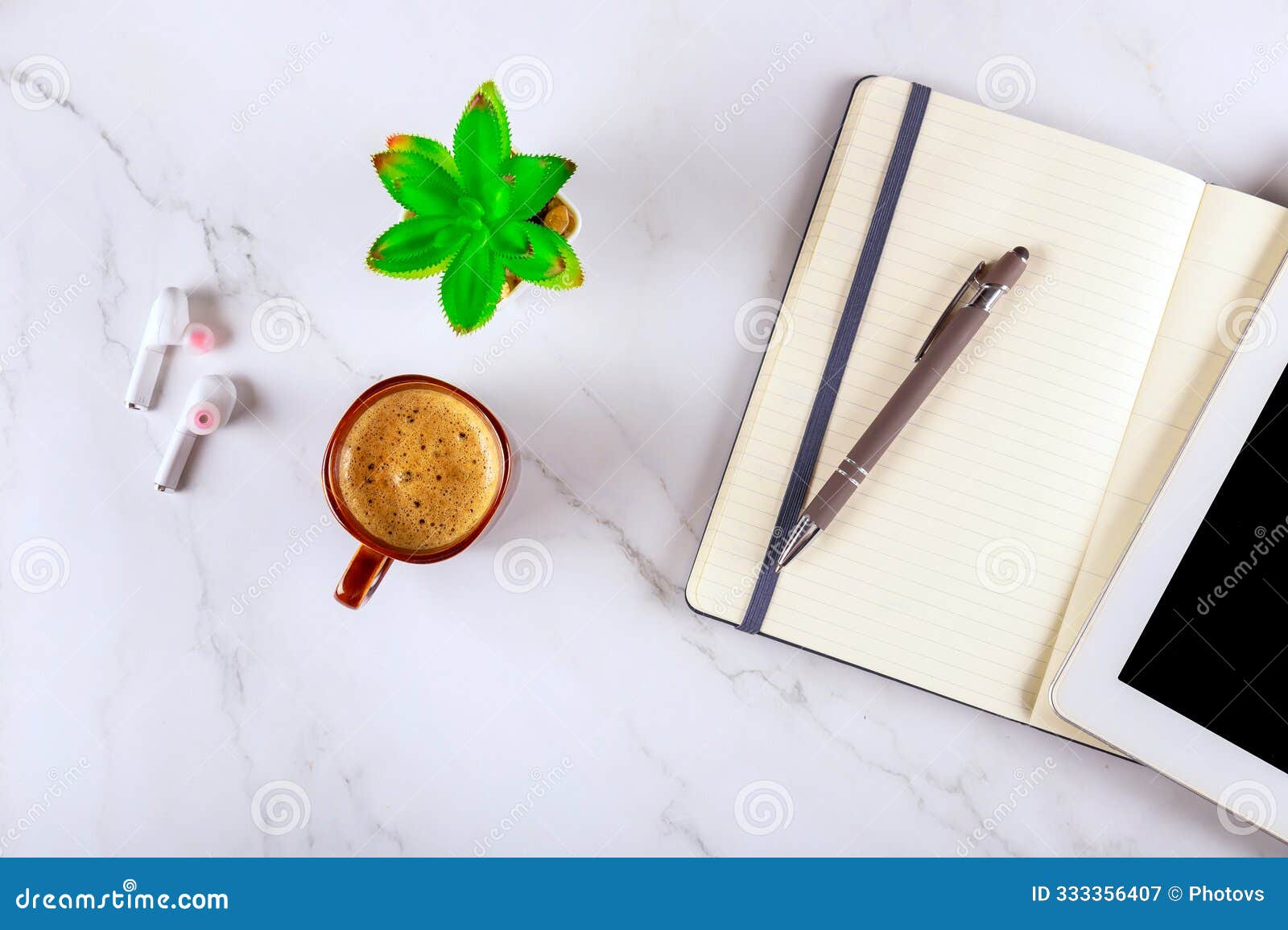 Workspace is Equipped with Laptop Computer, Espresso, Pen, Notebook, at ...