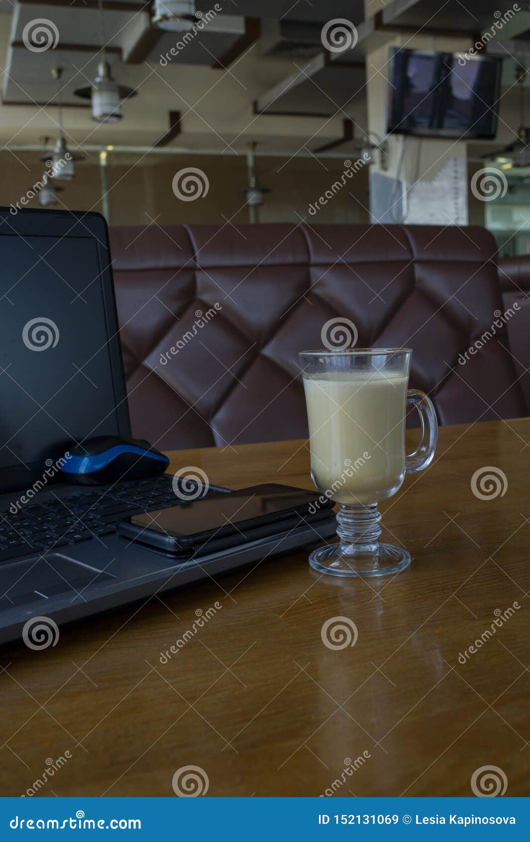 Workspace with Laptop, a Cup of Coffee and a Mouse for a Laptop, Phone ...