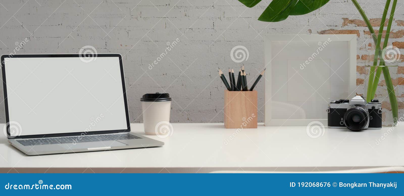 Workspace with Mock Up Laptop, Stationery, Camera, Decorations and Copy ...