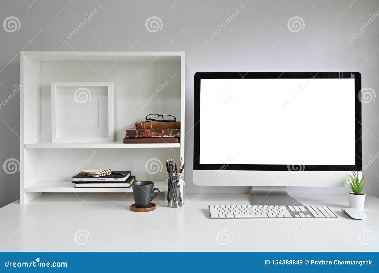 Workspace Mockup Computer on Office Desk and Books, Photo Frame and ...