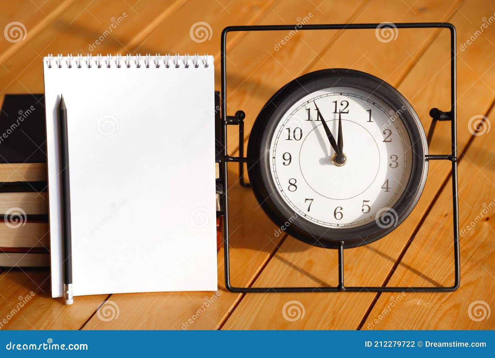 Workspace with Notepad and Desktop Clock Stock Photo - Image of blank ...