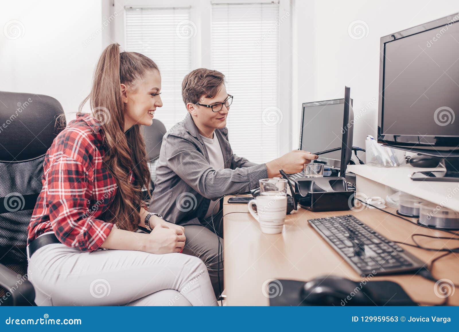 Workteam in Office Working on Desktop Computer Stock Image - Image of ...