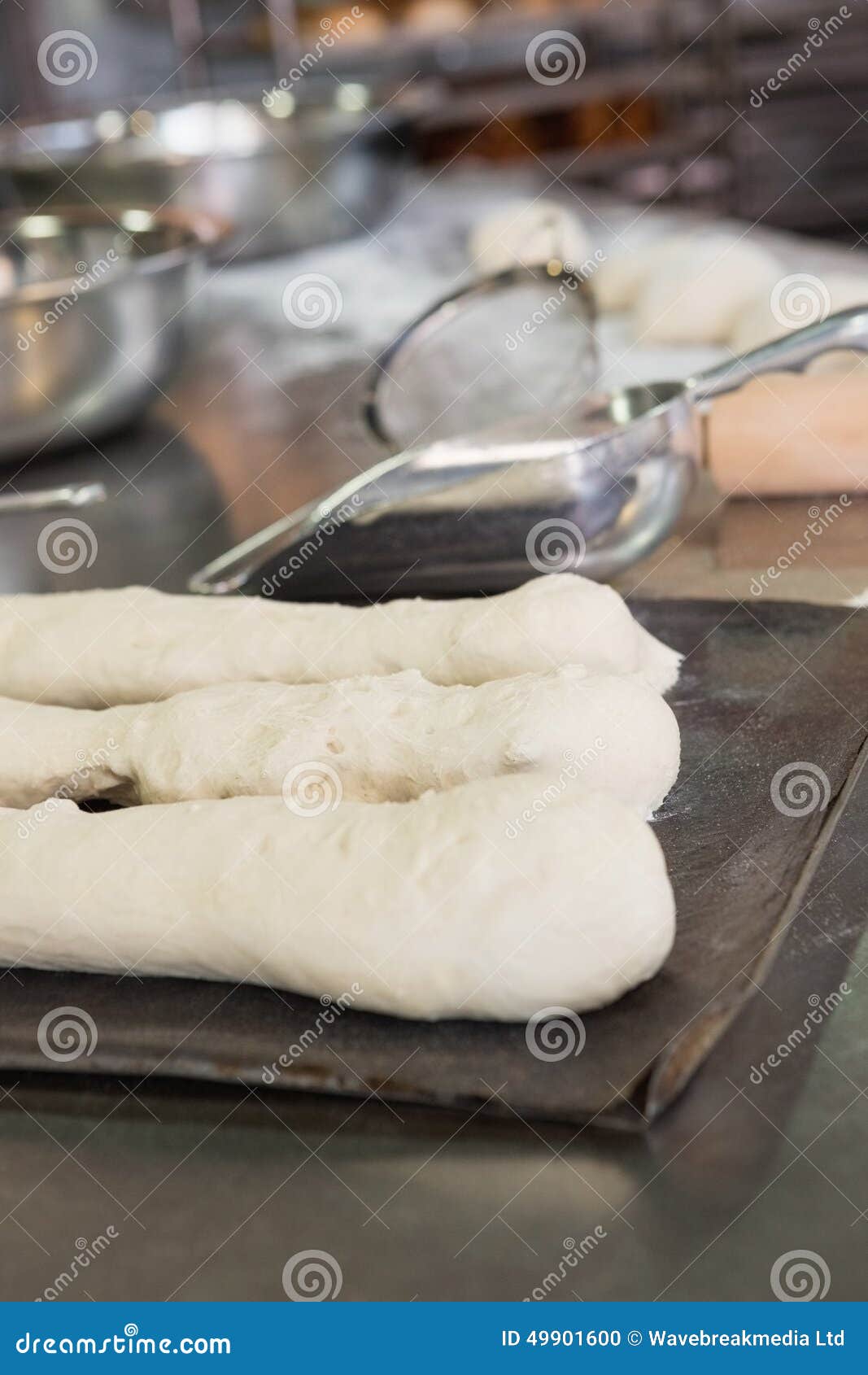 Worktop with Uncooked Baguettes and Breads Stock Photo - Image of ...