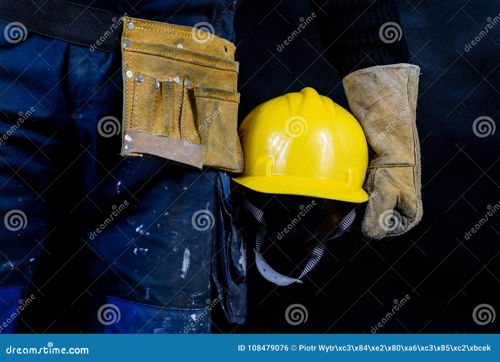 Workwear for Production Workers. a Construction Worker Holding P Stock ...