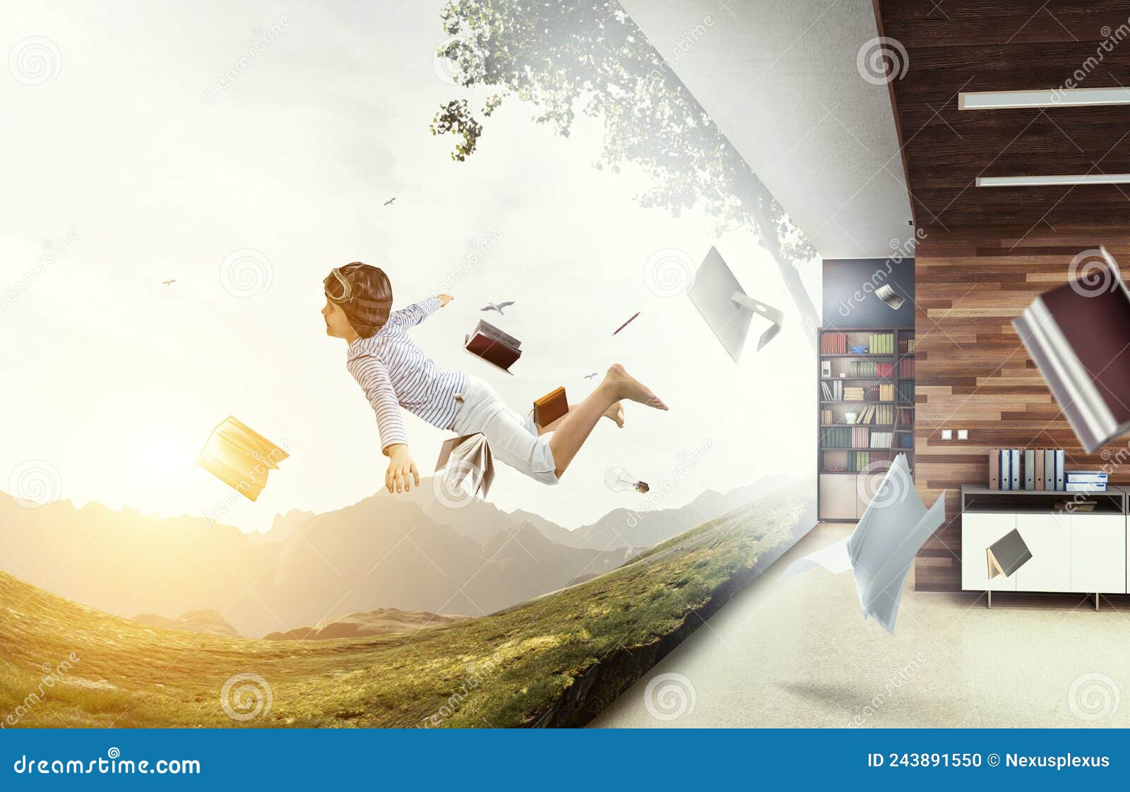 World of Books Concept with Flying Boy . Mixed Media Stock Photo ...