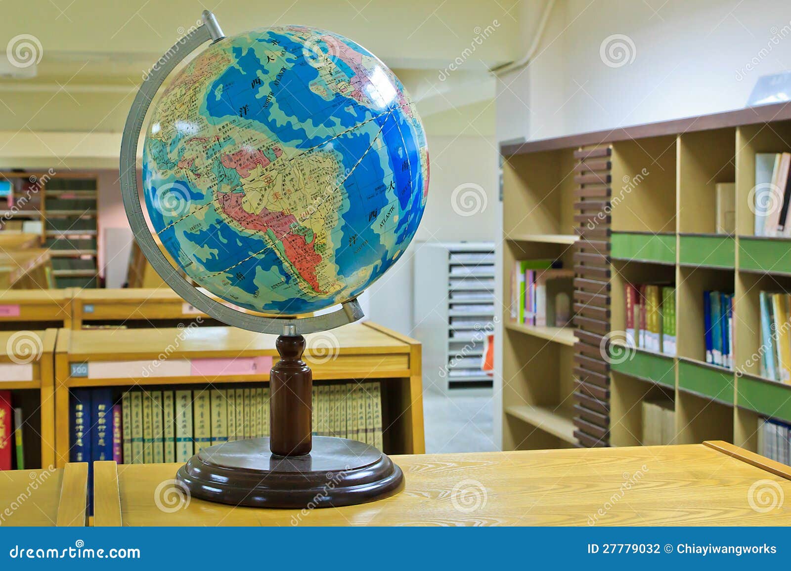 World Globe in Library stock photo. Image of bookshelf - 27779032