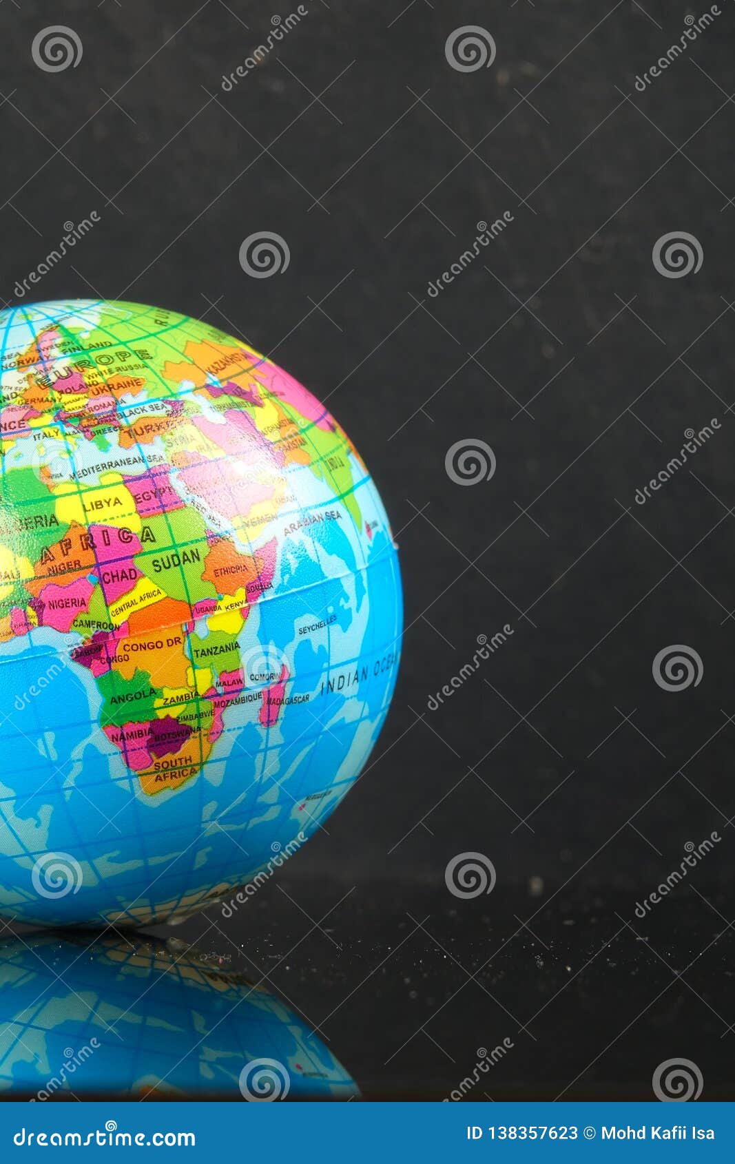 World Globe with Reflection on Black. Stock Image - Image of holding ...