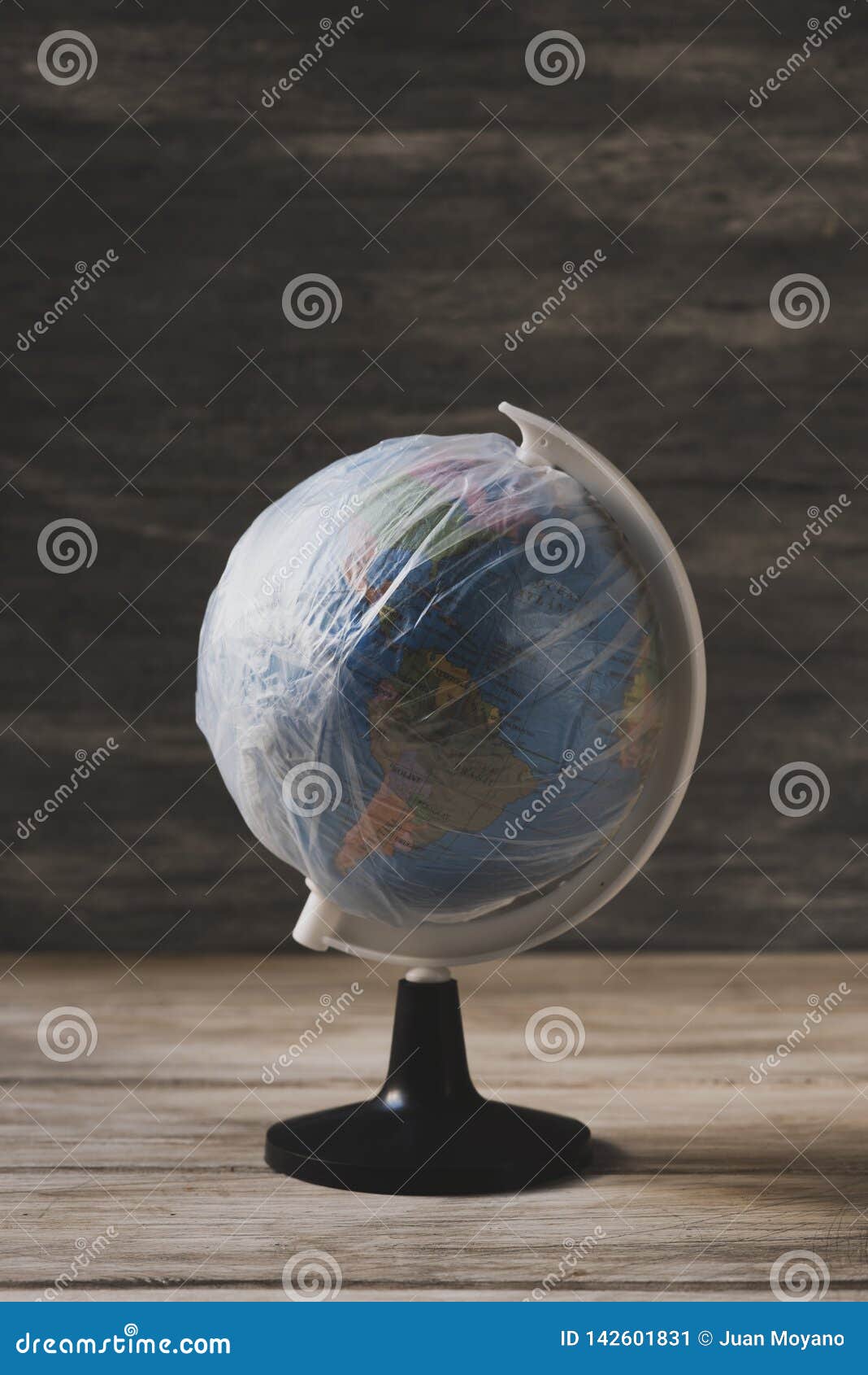 World Globe Wrapped in Plastic Stock Image - Image of excess, cling ...