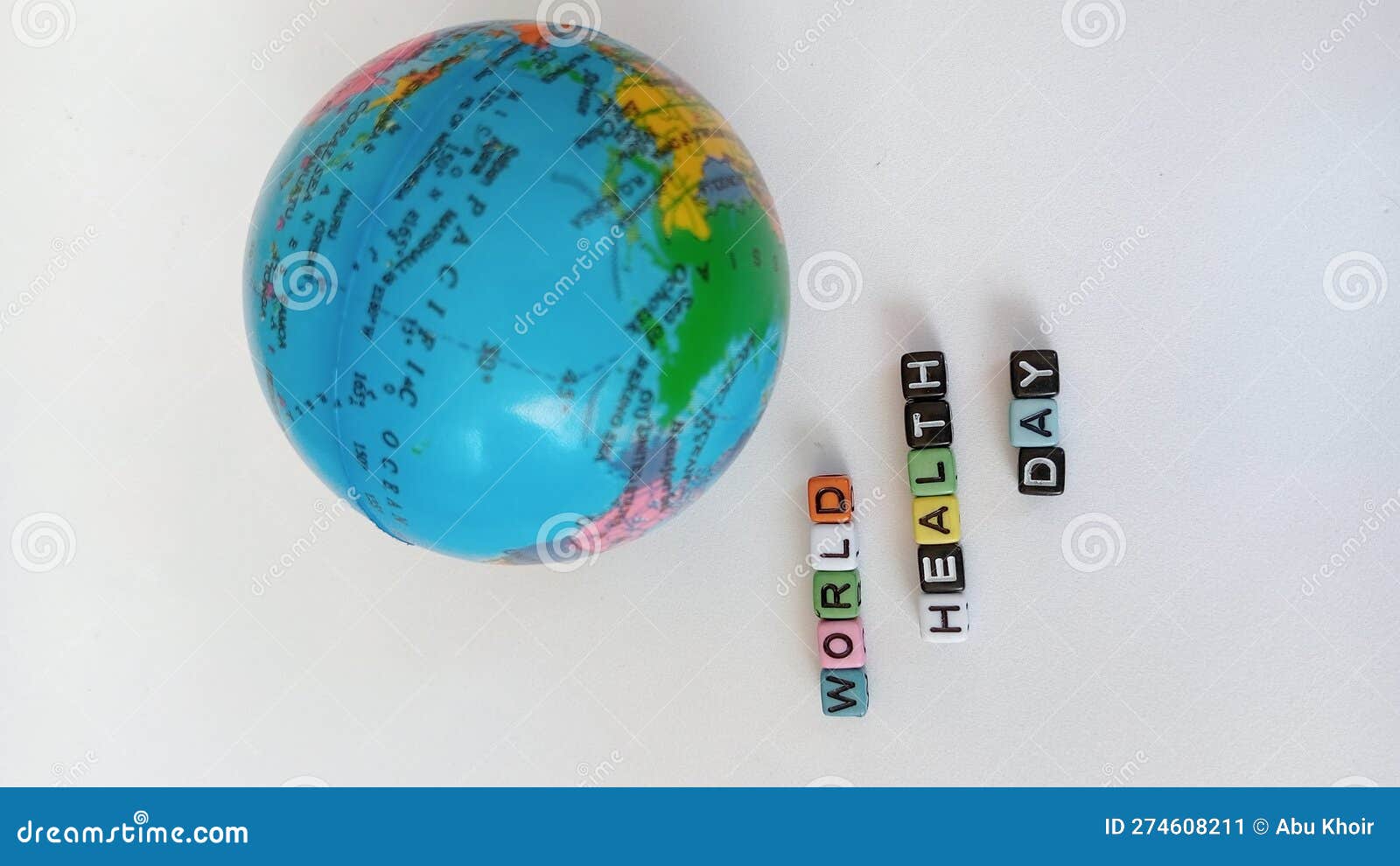 World Health Day Word Made with Plastic Blocks and Blue Mini Globe ...