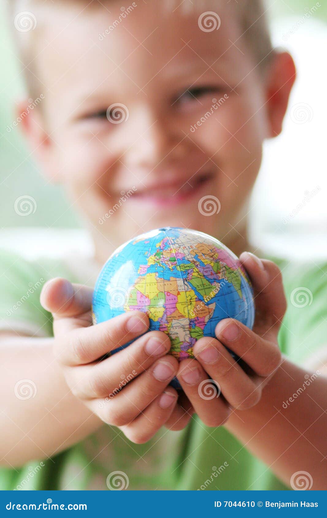 The world in kids hands stock photo. Image of climate - 7044610