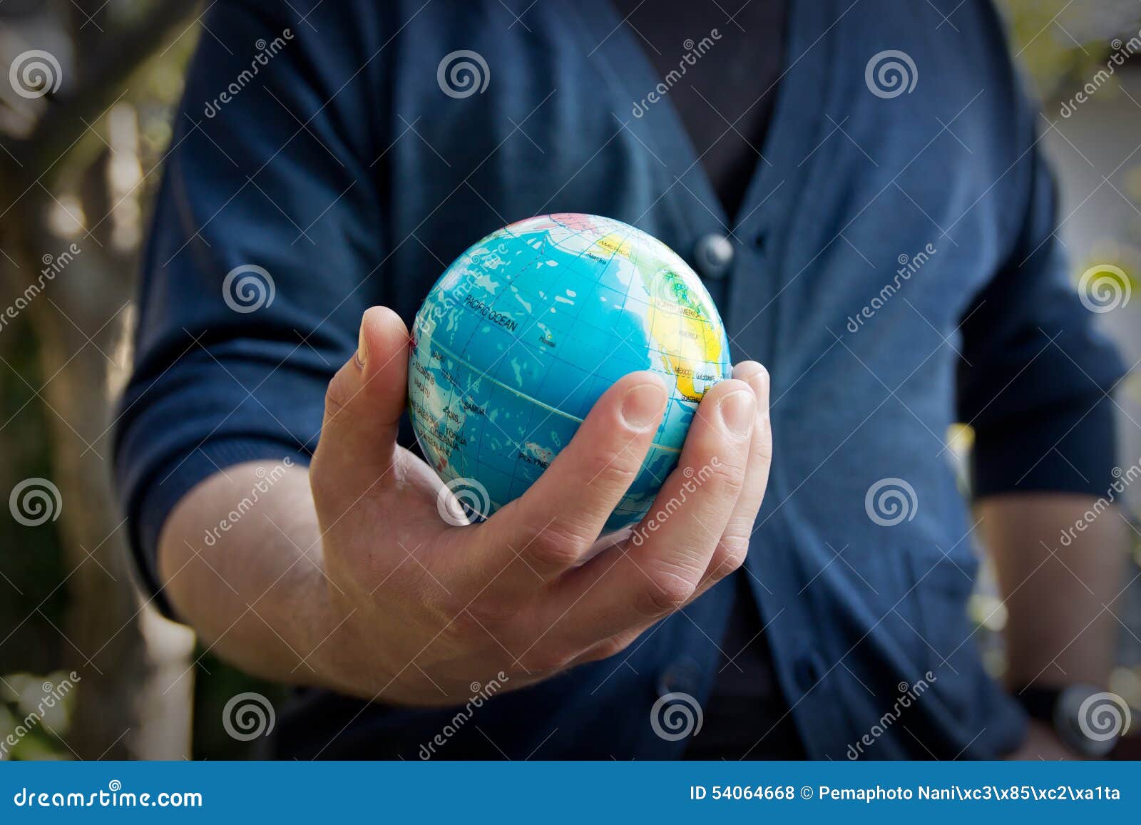 World in Your Hand stock photo. Image of holding, power - 54064668