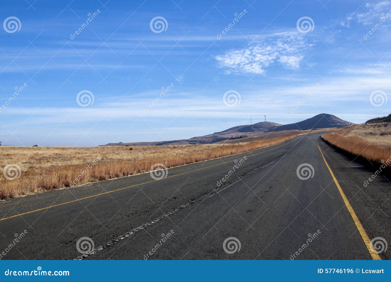 Worn Asphalt Road Heading into the Mountains Stock Photo - Image of ... Worn Asphalt Road Heading into the Mountains Stock Photo - Image of ...