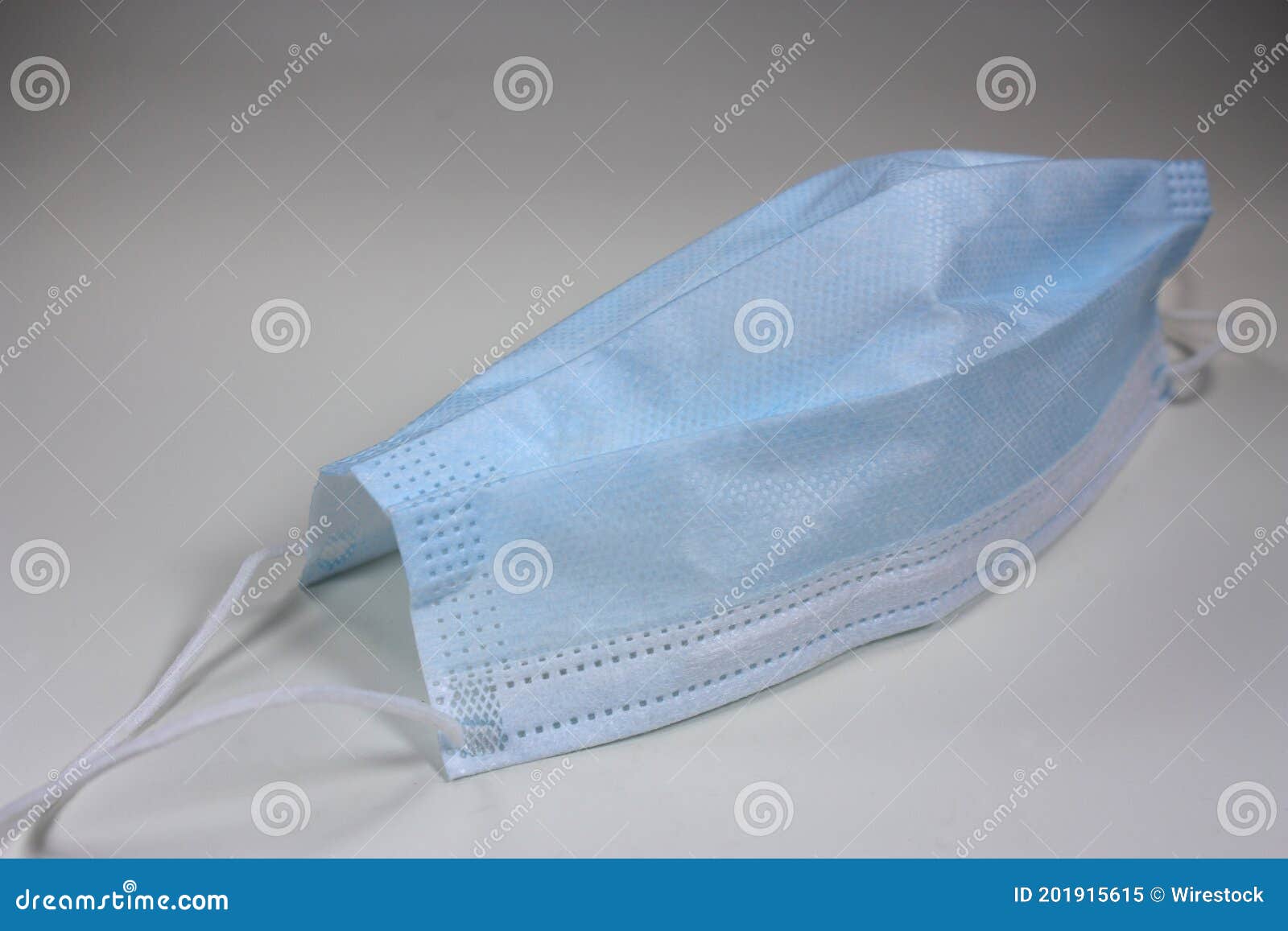 Worn Face Mask on a White Background Stock Image - Image of masks ...