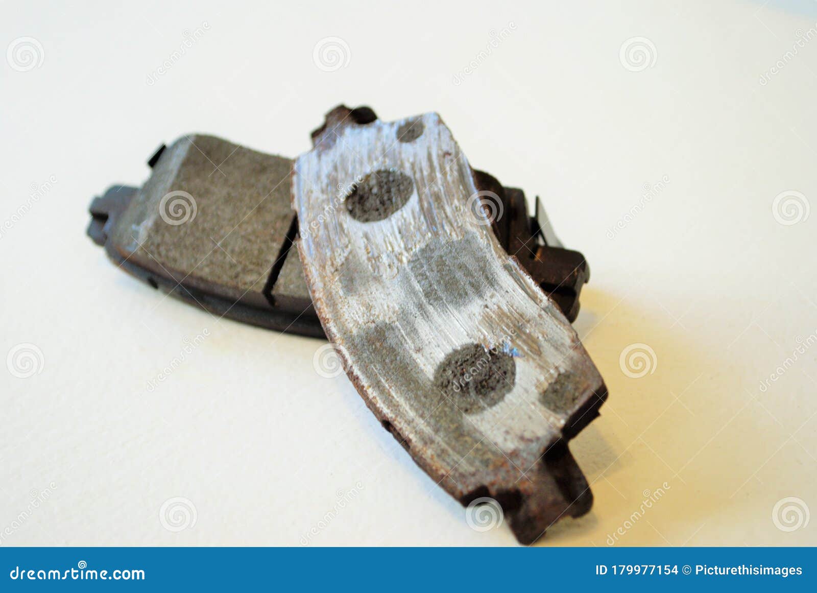 Worn Out Ruined Disc Brake Pad Compared To One that is New Stock Photo ...