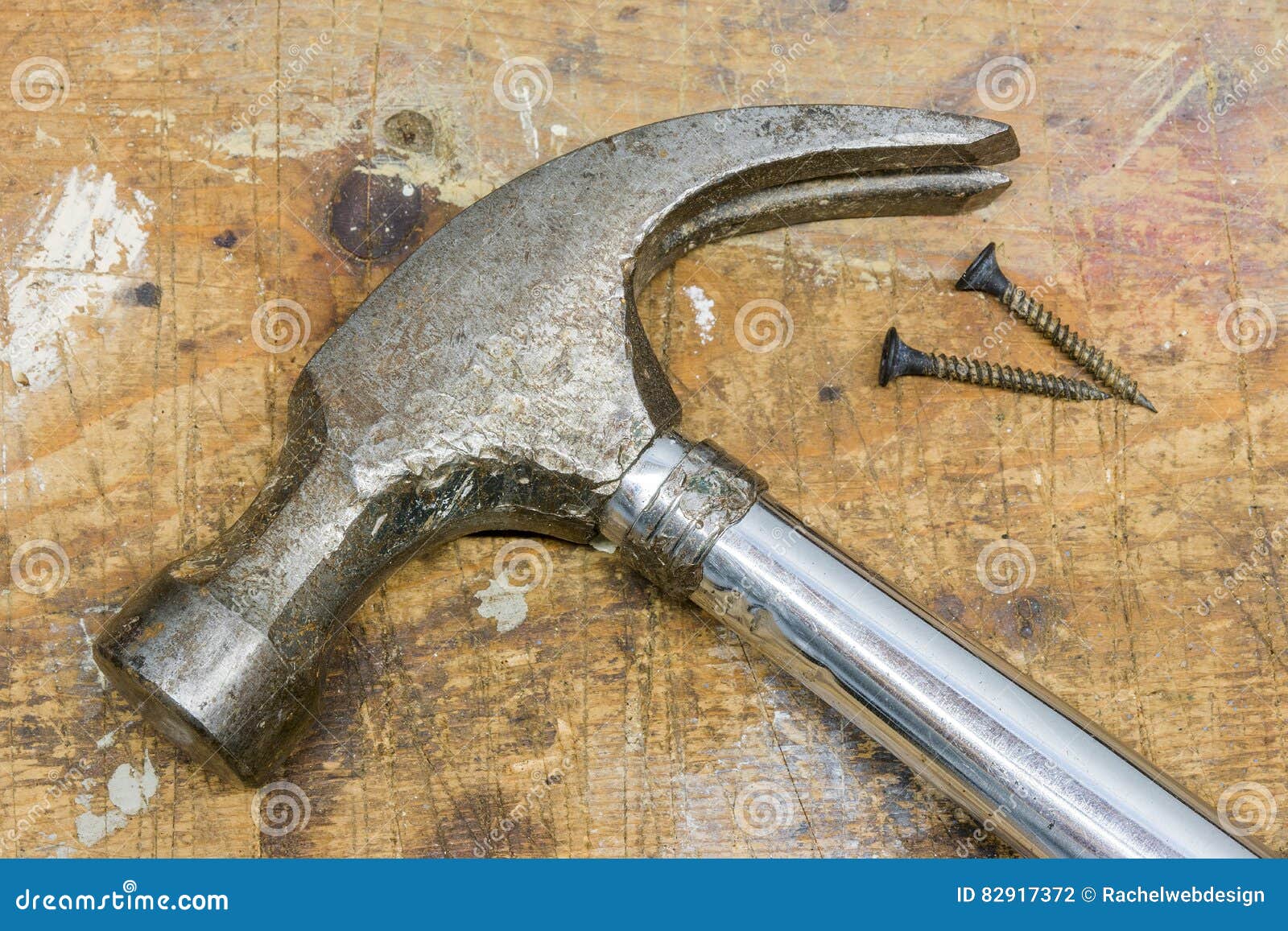 Worn and Rusted Hammer and Screws Closeup on Scratched Workbench Stock ...