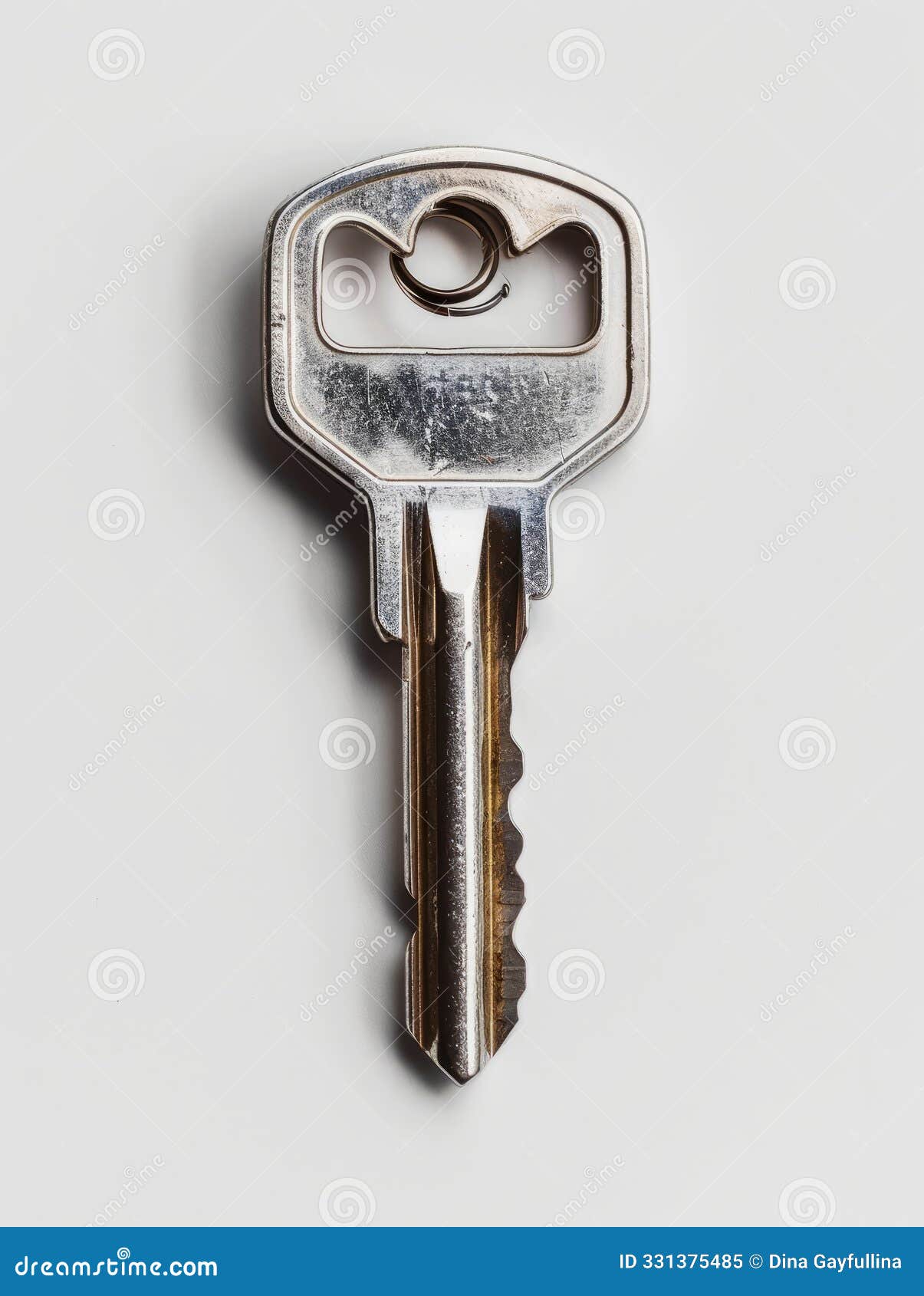 A Worn Silver Key with Scratches on a Plain White Background. Stock ...