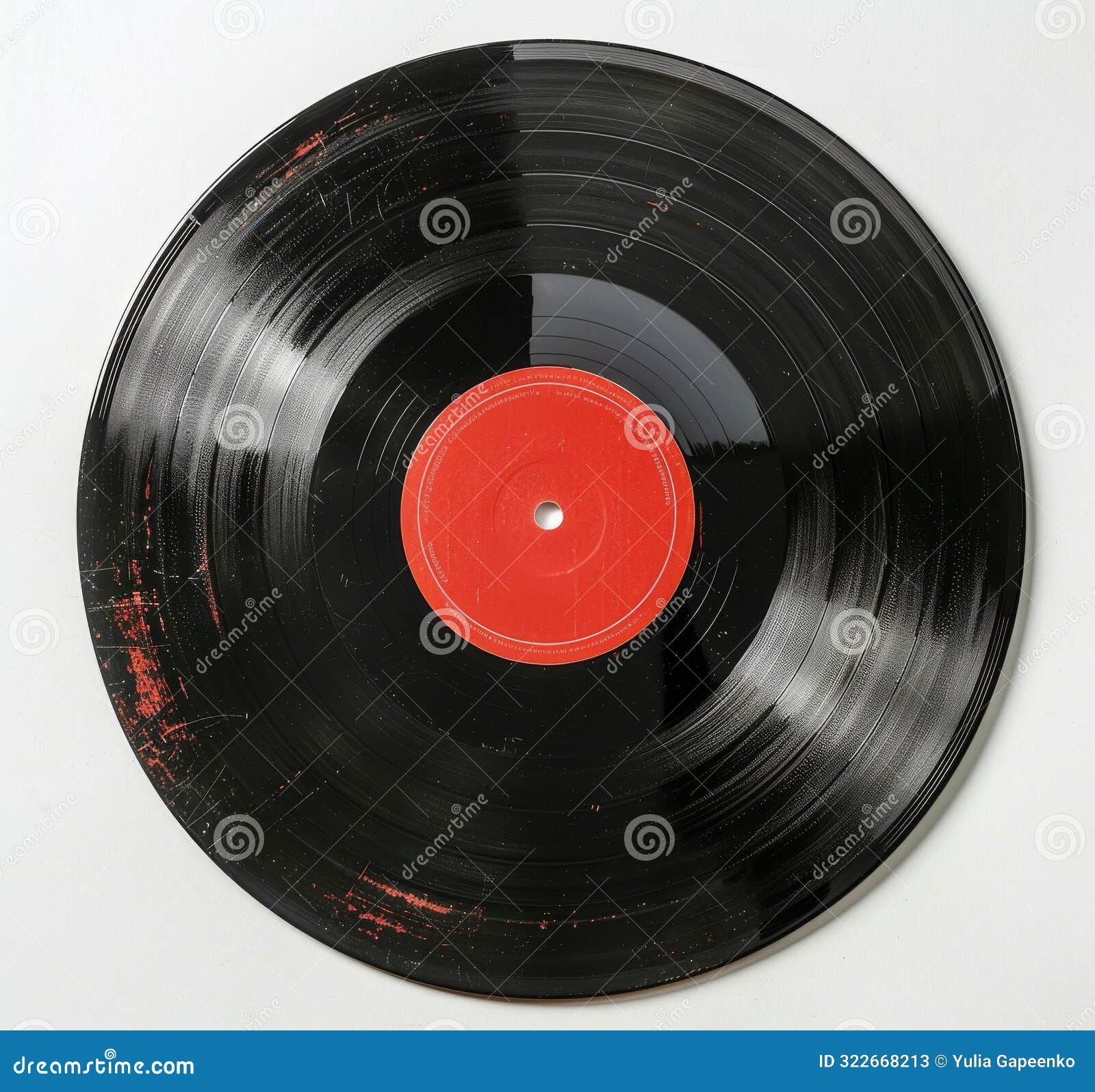 A Worn Vinyl Record with a Red Label on a White Background Stock Image ...