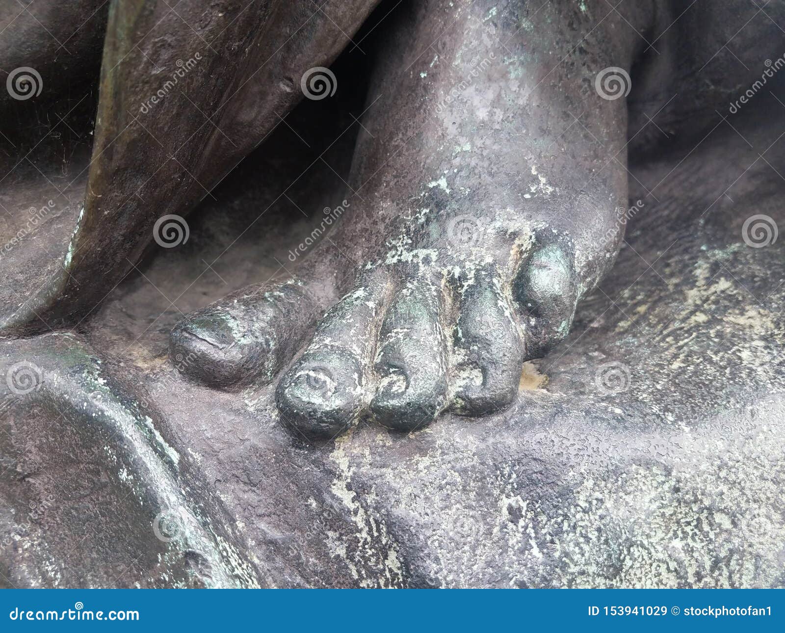Worn or Weathered Feet on Metal Statue Stock Image - Image of worn ...