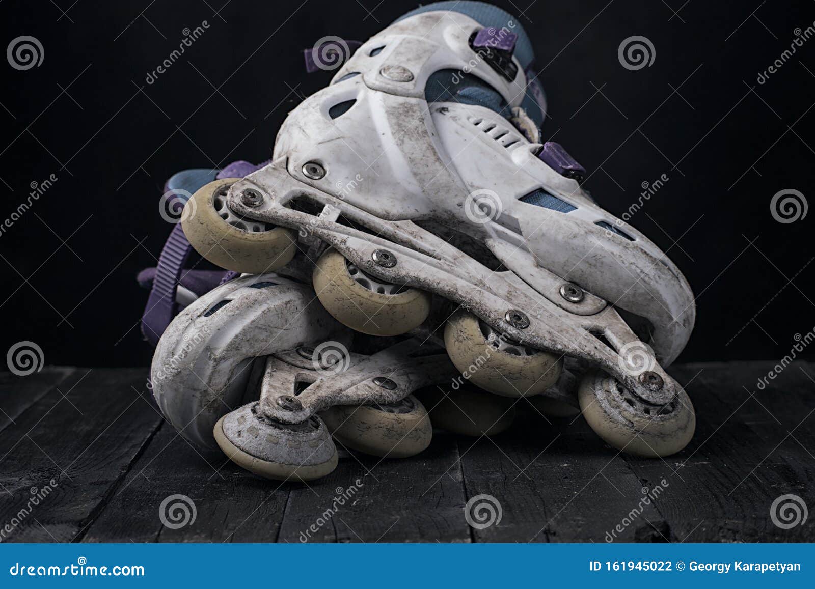 Worn Roller Skates on a Dark Background Stock Photo - Image of isolated ...