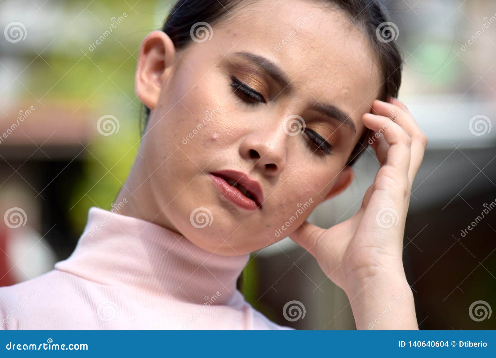 A Worried Asian Person stock photo. Image of nervous - 140640604