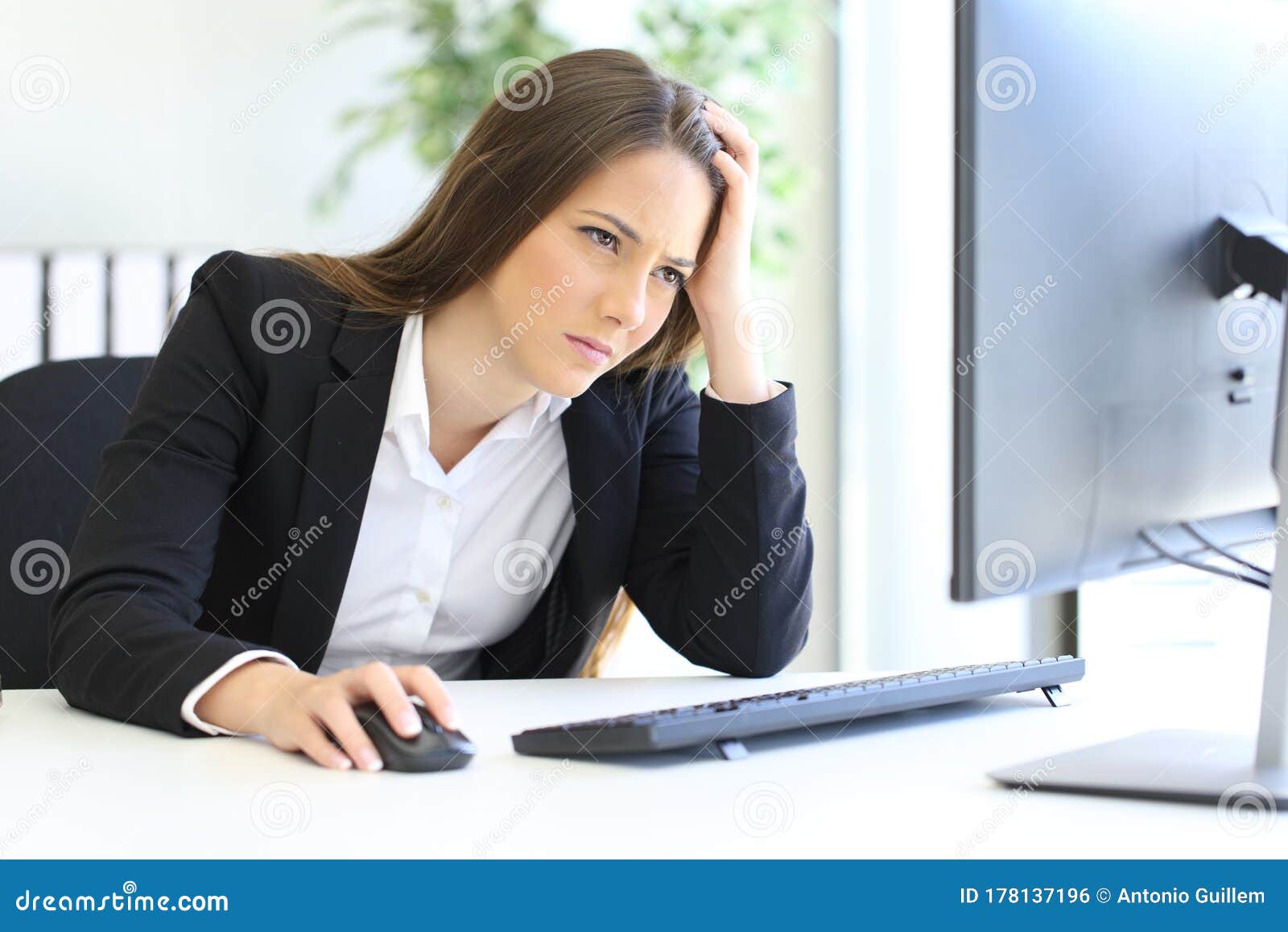Worried Businesswoman Checking Computer Content Stock Photo - Image of ...