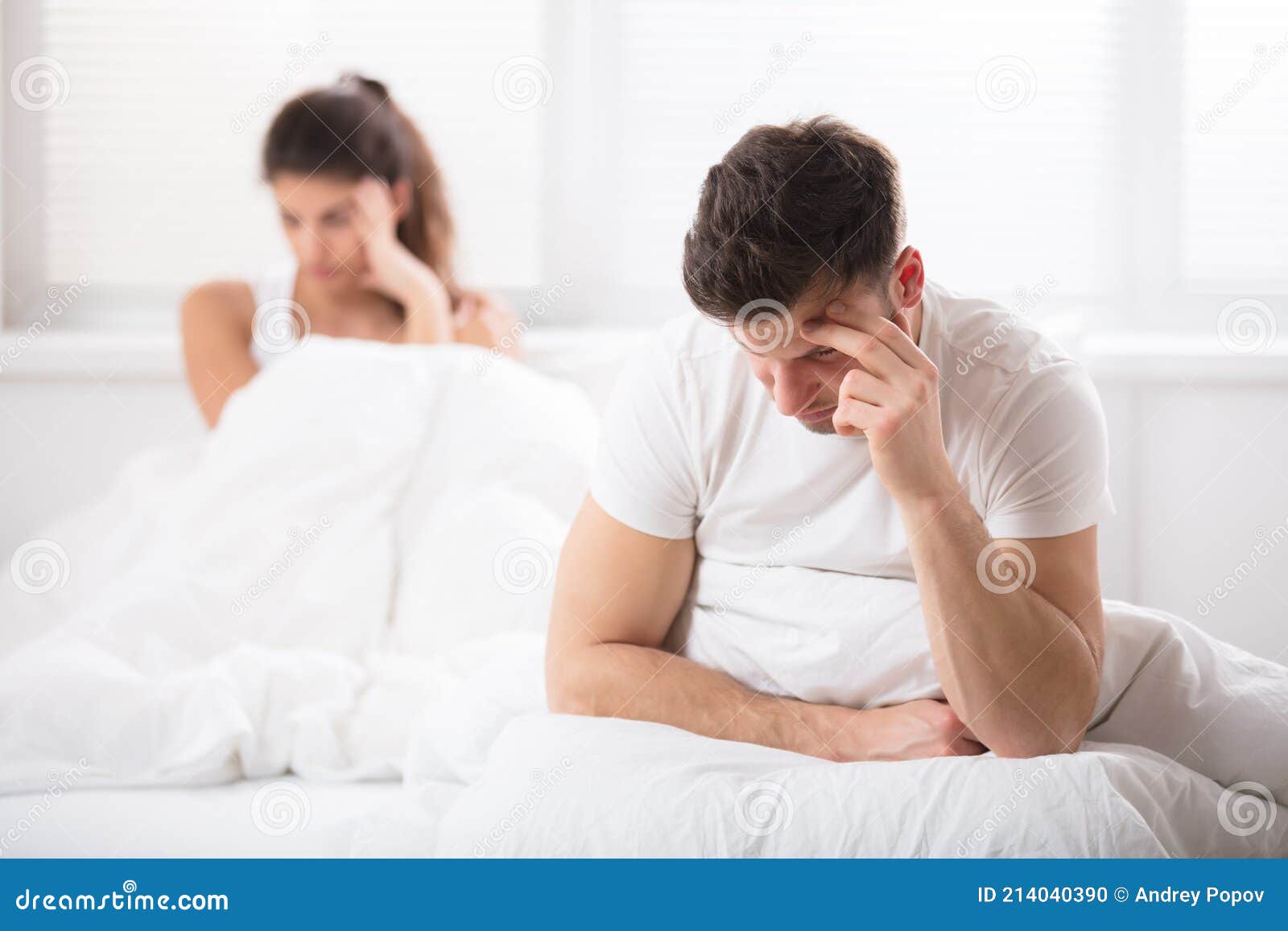 Worried Couple Sitting on Bed Stock Photo - Image of headache, home ...