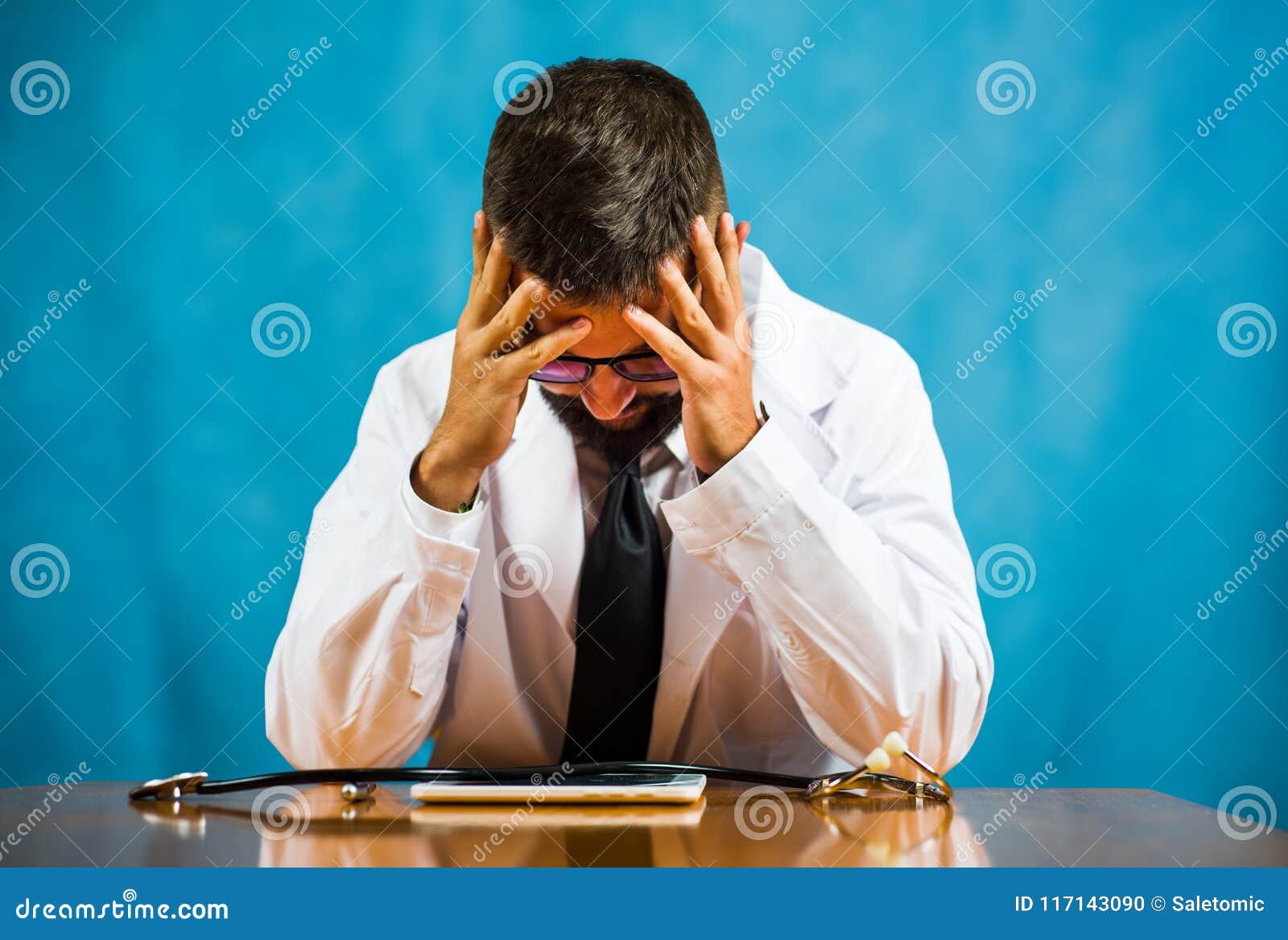 Worried Doctor Showing Concern on the Table Stock Photo - Image of loss ...