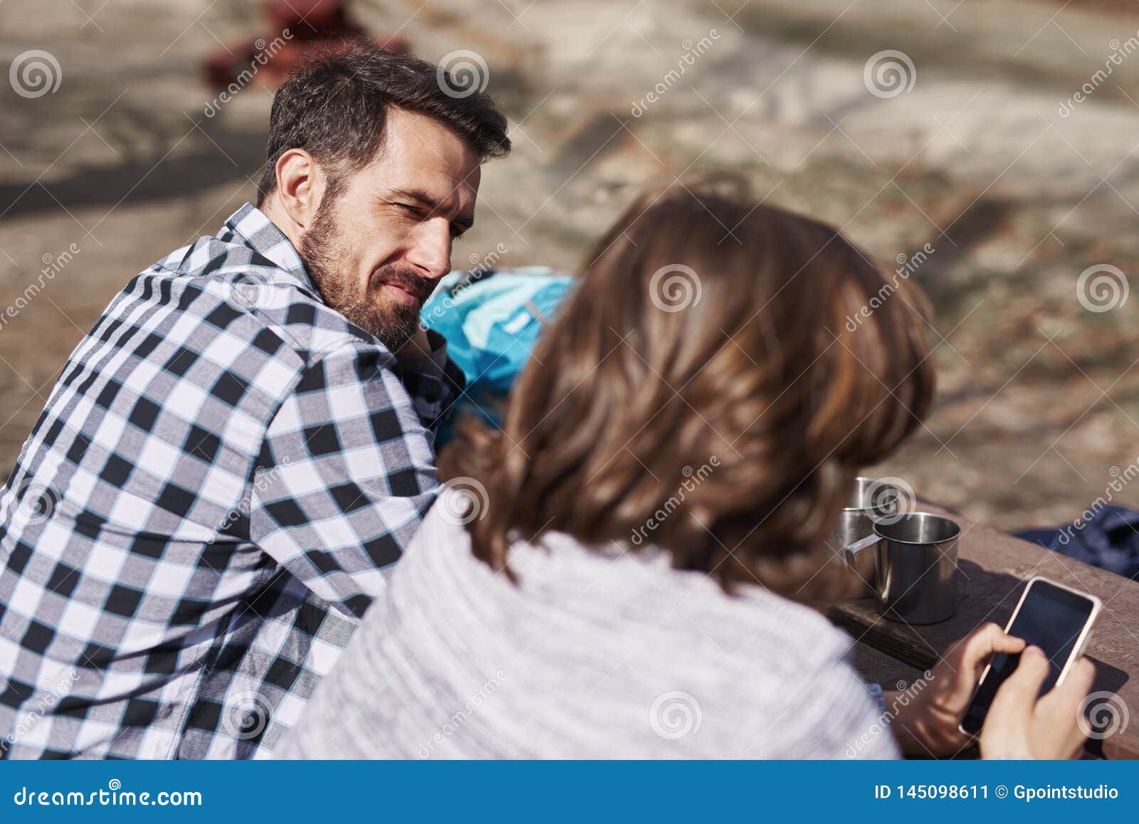 Worried Father Looking at His Son Who is Using Mobile Phone Stock Image ...