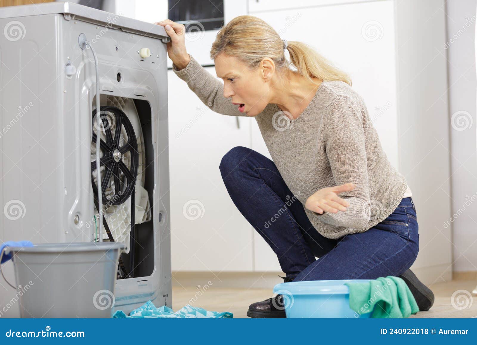 Worried Female Experiencing Problems with Washing Machine Stock Photo ...