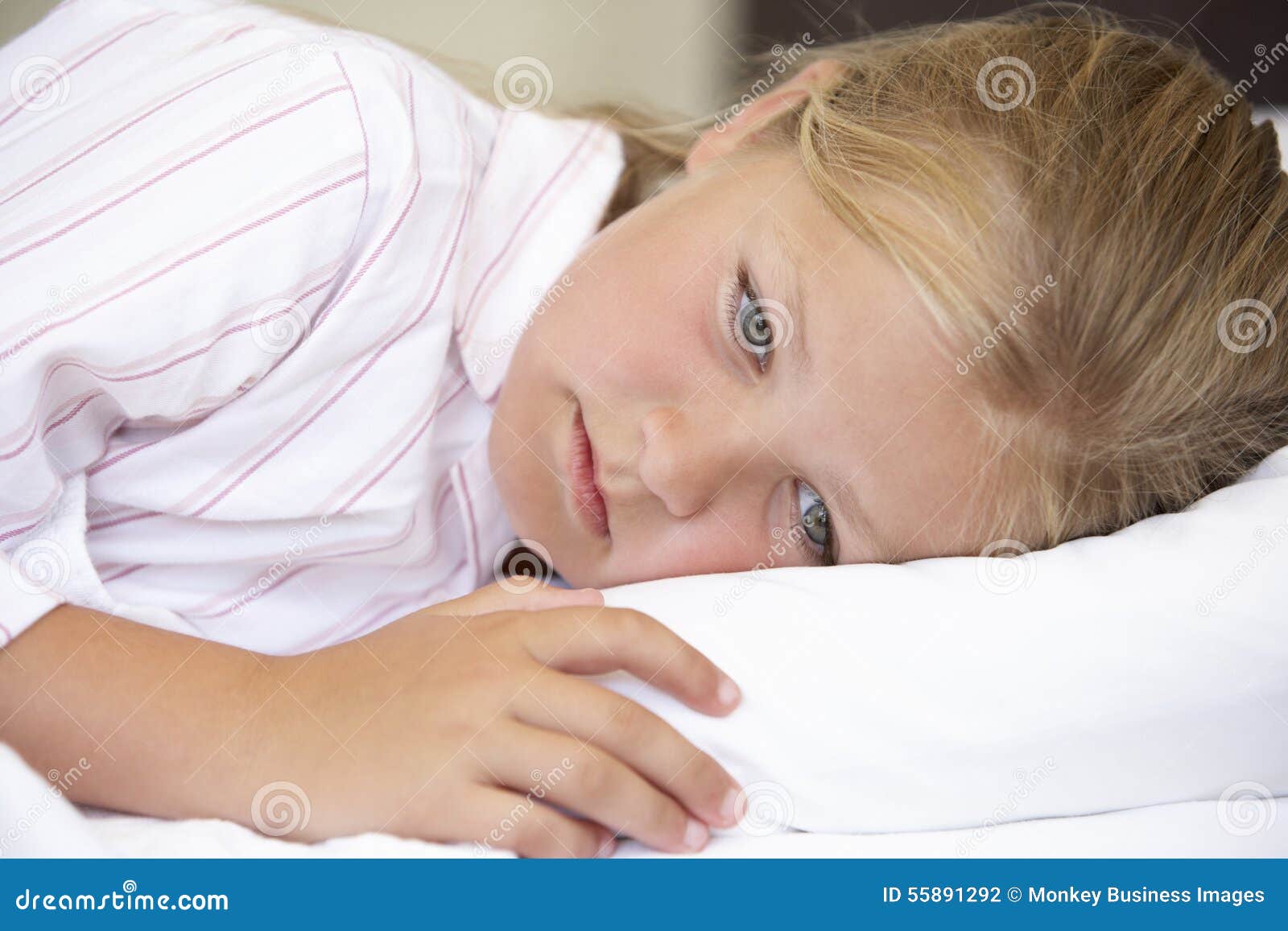 Worried Looking Young Girl in Bed Stock Photo - Image of worried ...