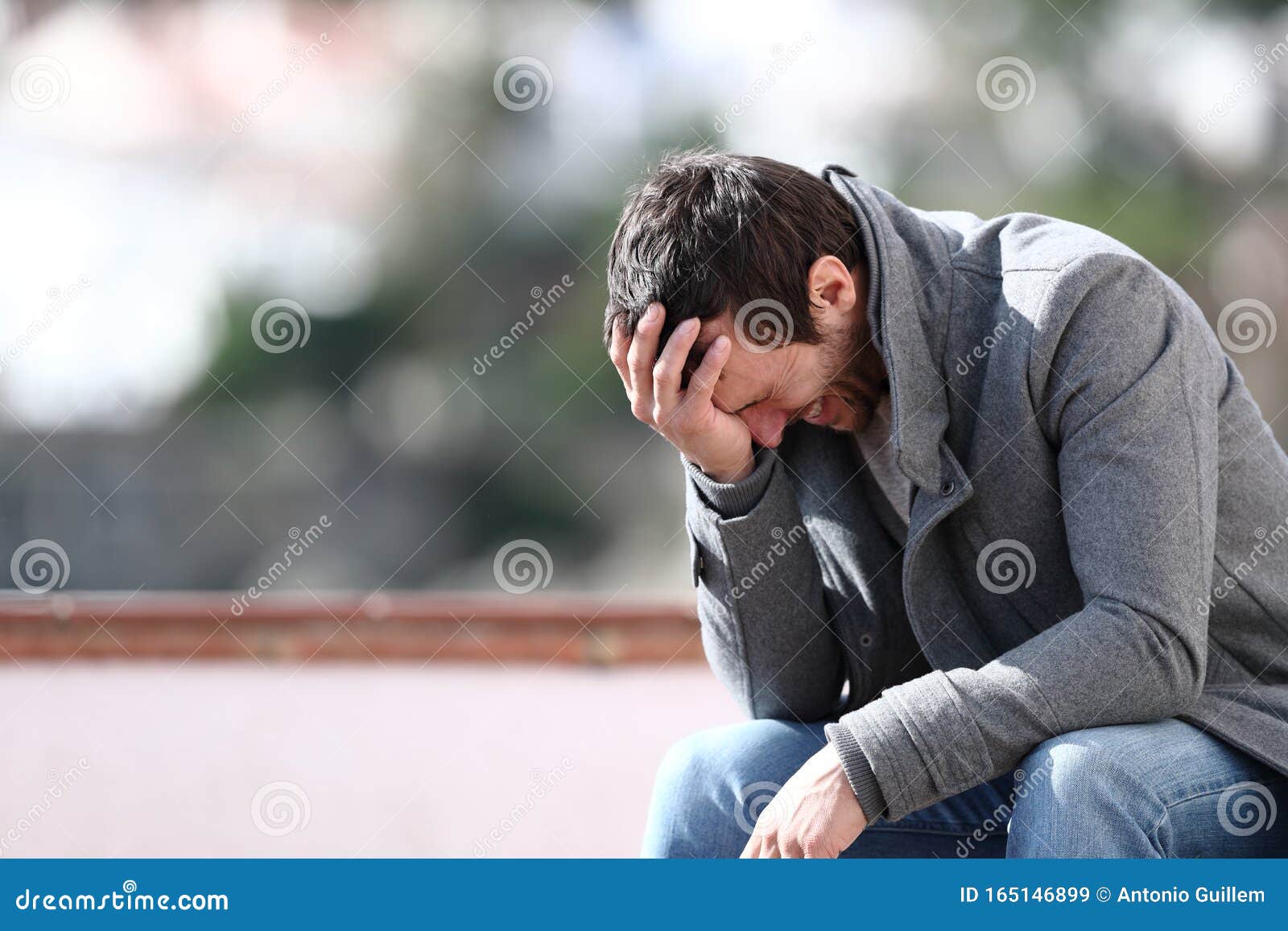 Worried Man Complaining Sitting on a Bench in Winter Stock Image ...